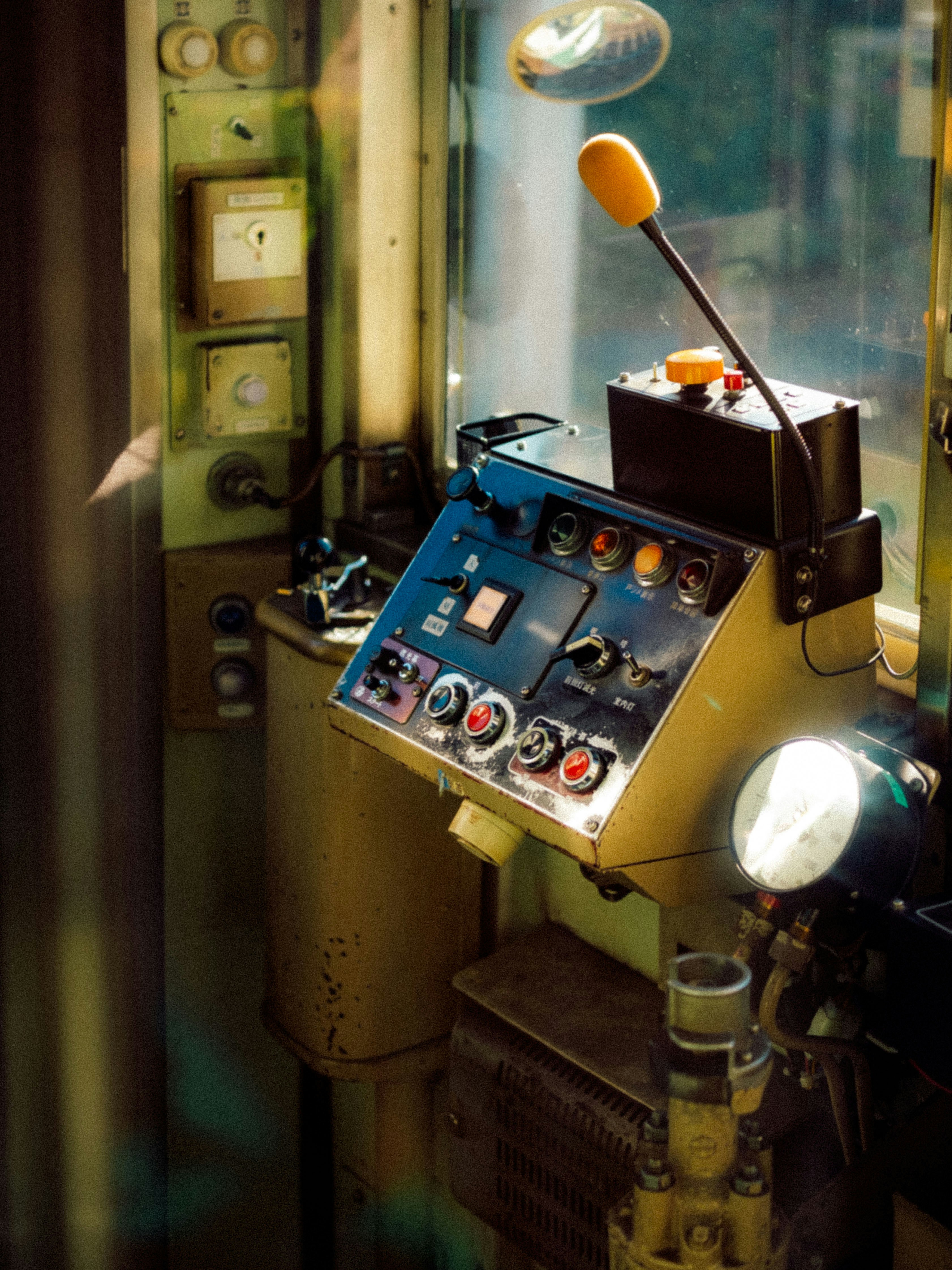 Industrial Control Console in a Dimly Lit Workshop