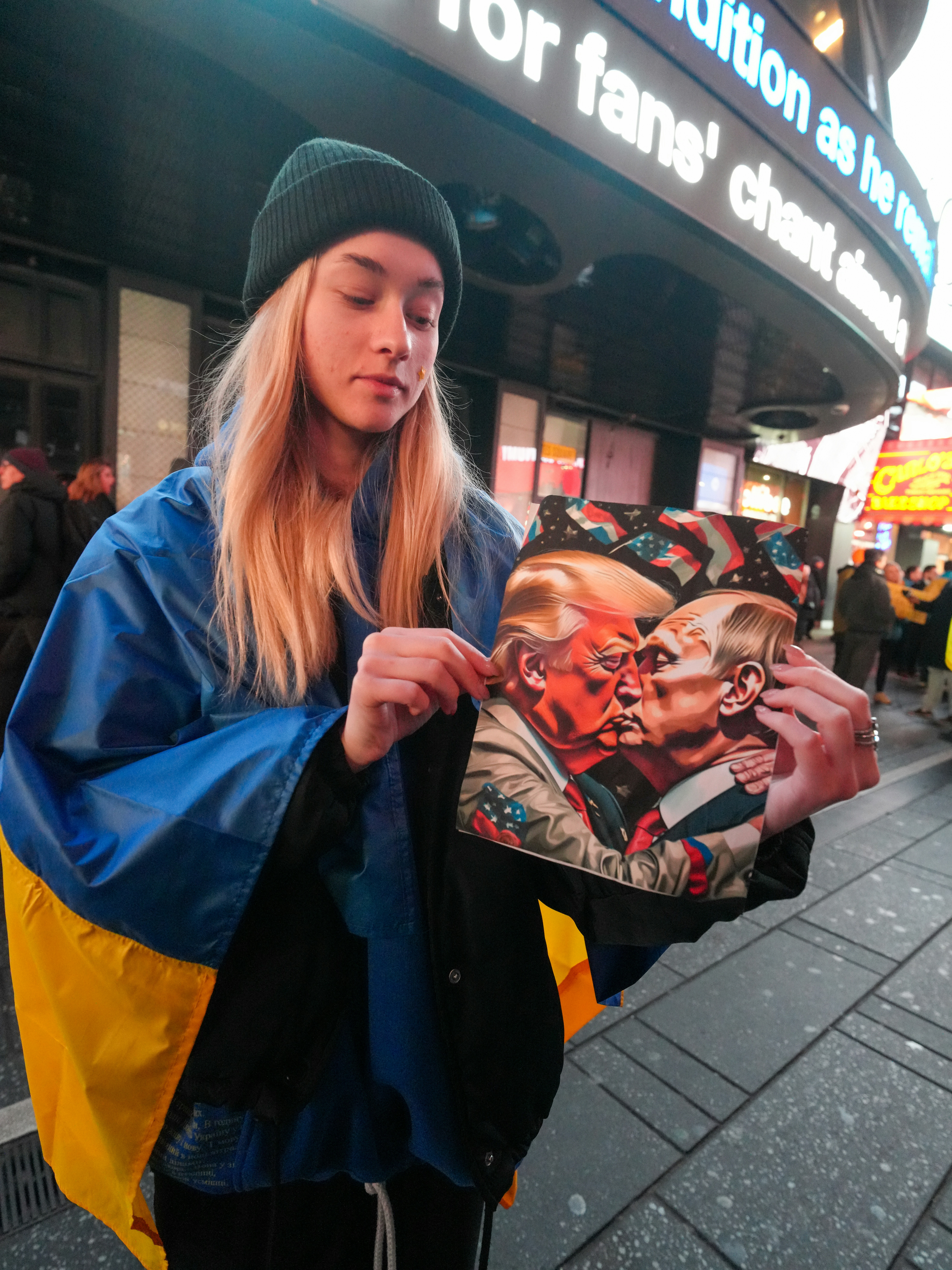 Portrait with a Political Portrait: A Street Artist Shares a Bold Cardboard Scene