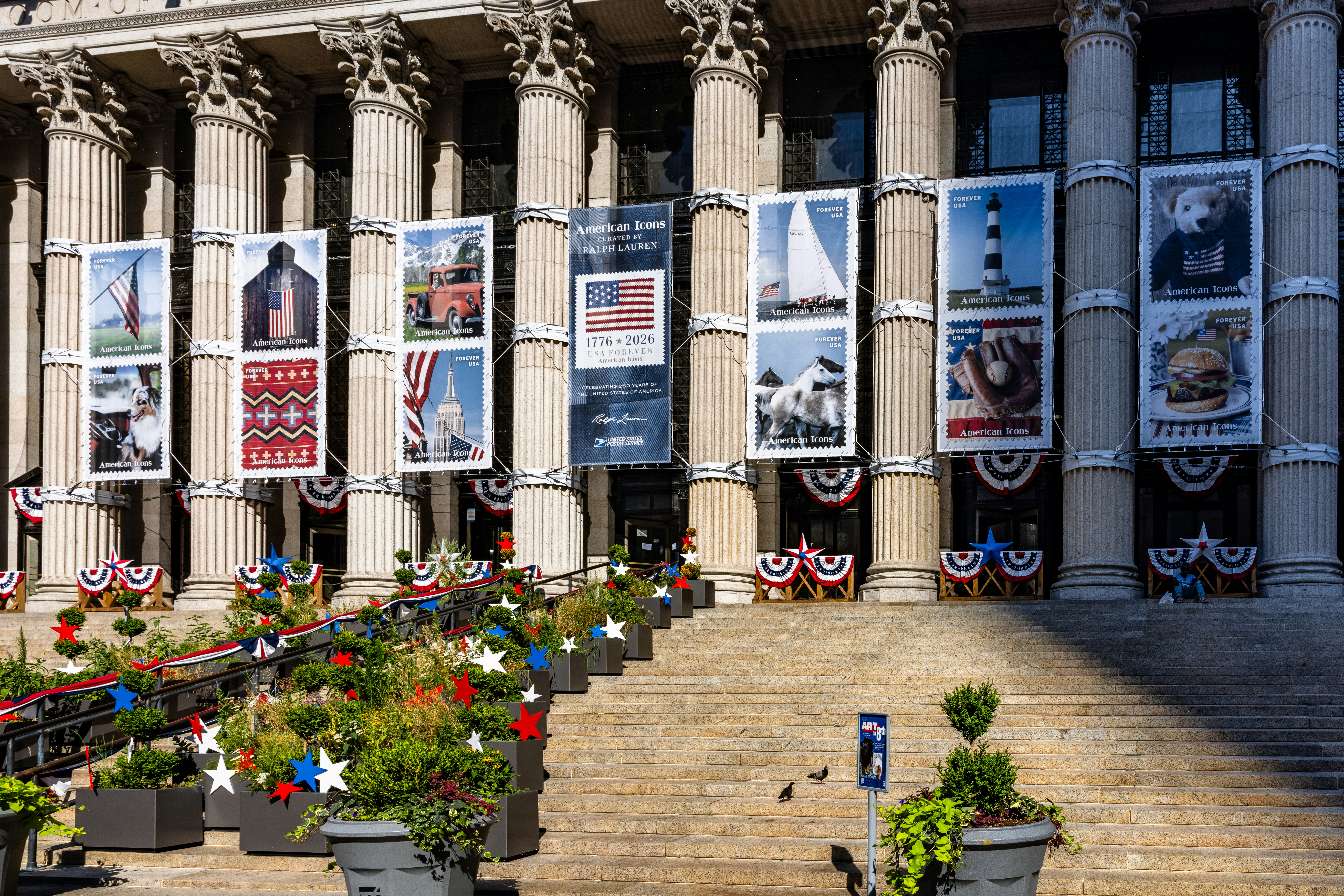 Steps to History: Banners and Columns in Front of a Monumental façade