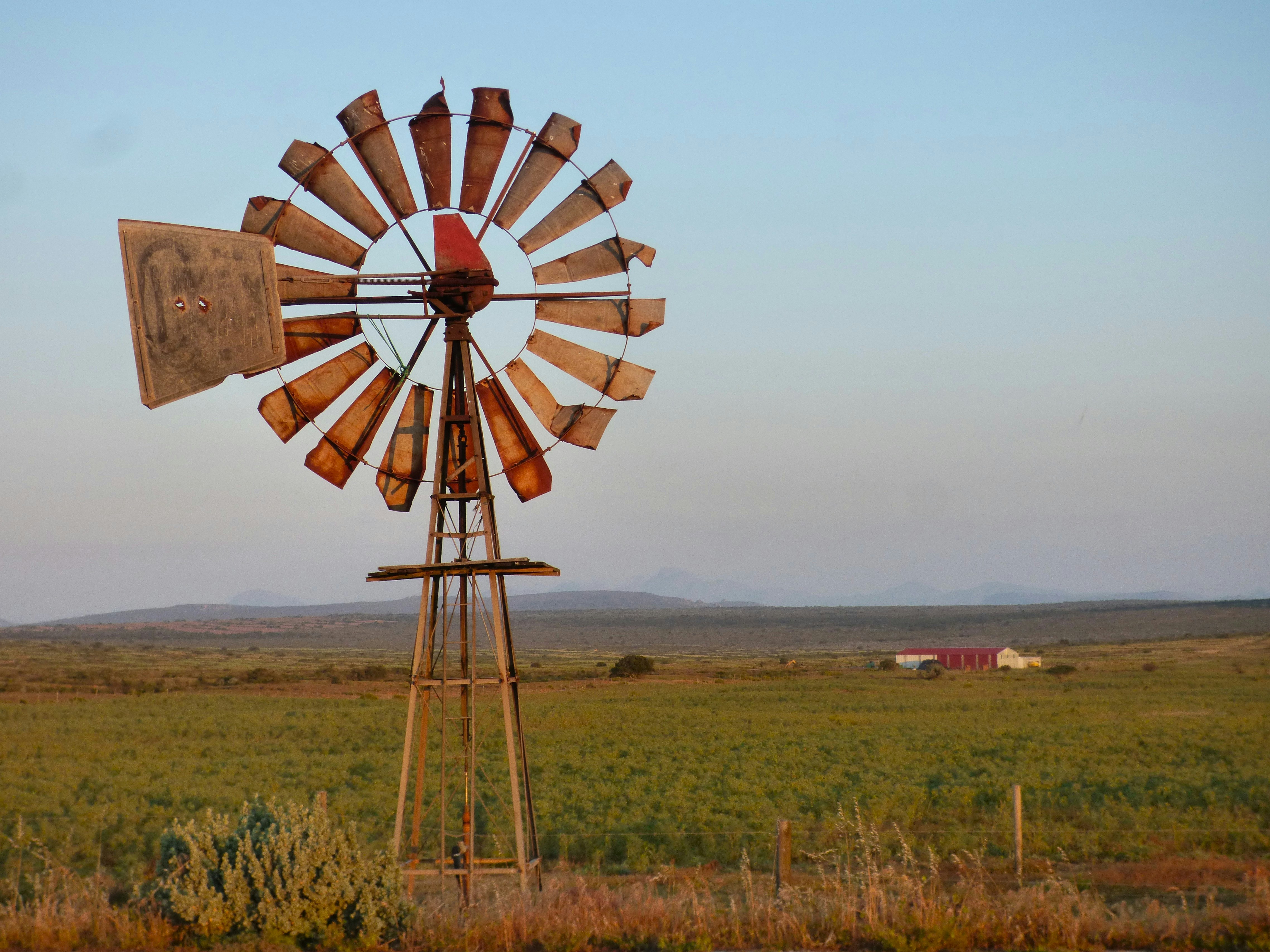 Desert Windmill Standing Sentinel Over Open Plains