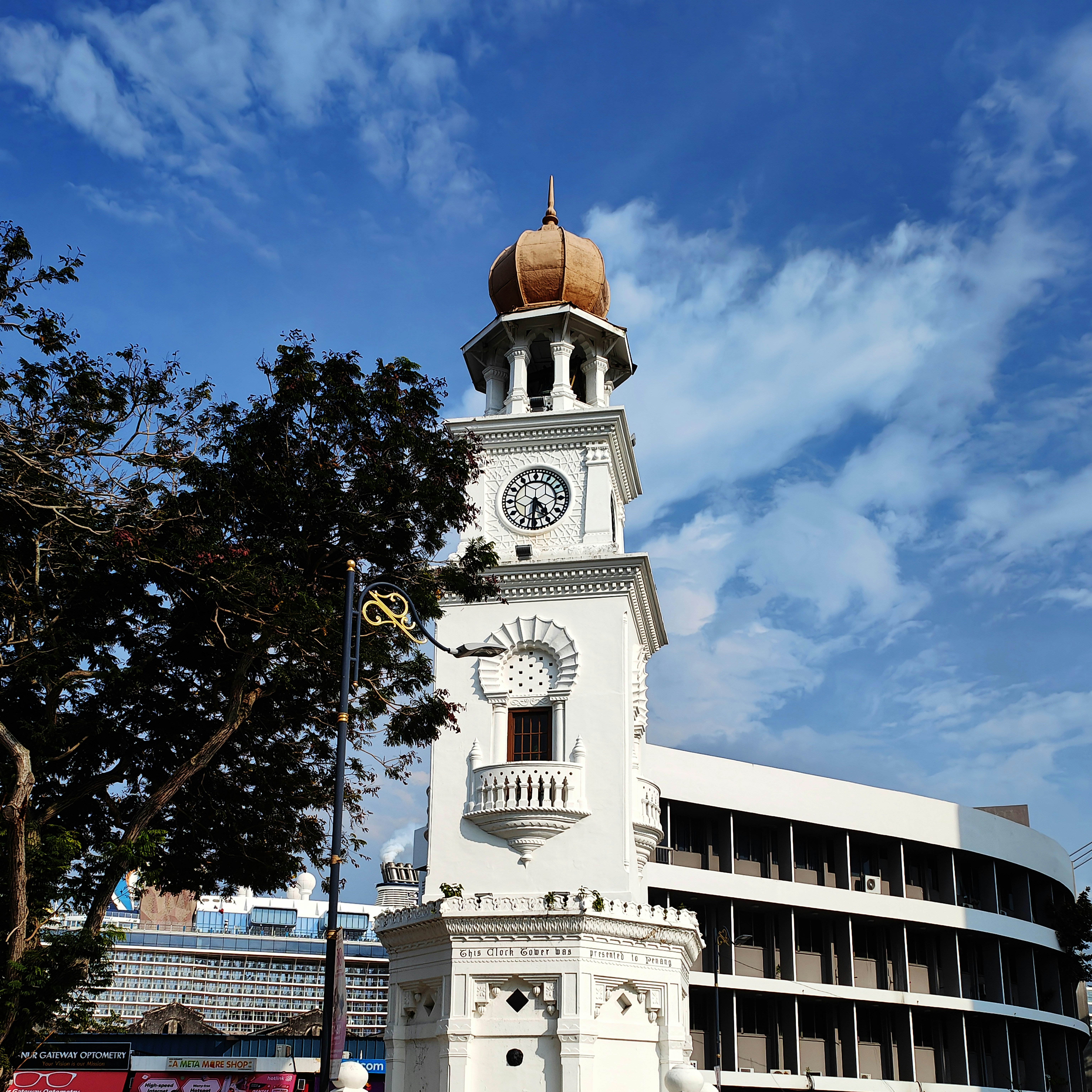 Clocktower Soaring Above the Urban Span