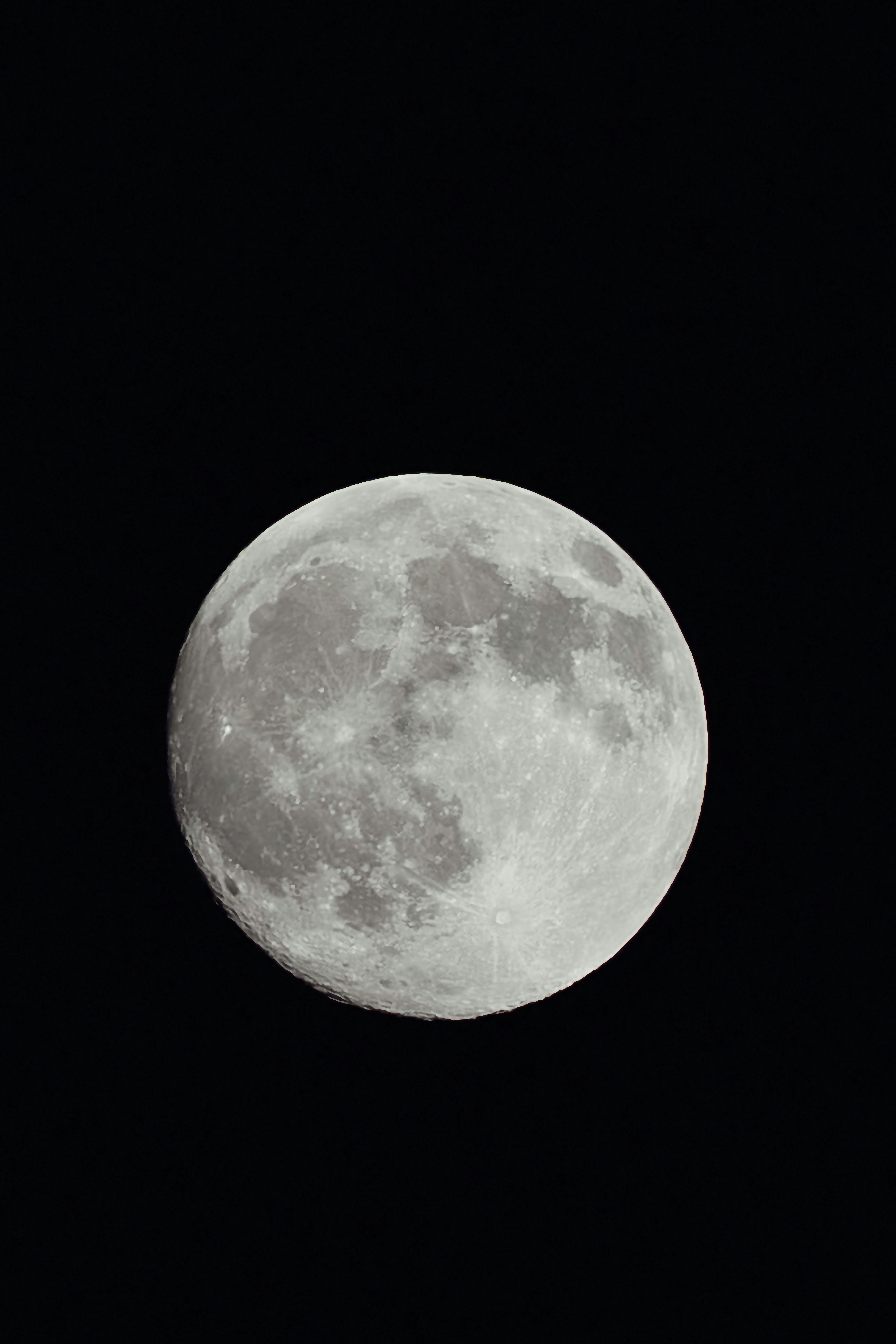 Moon in Focus: Crisp Lunar Detail Across a Black Night