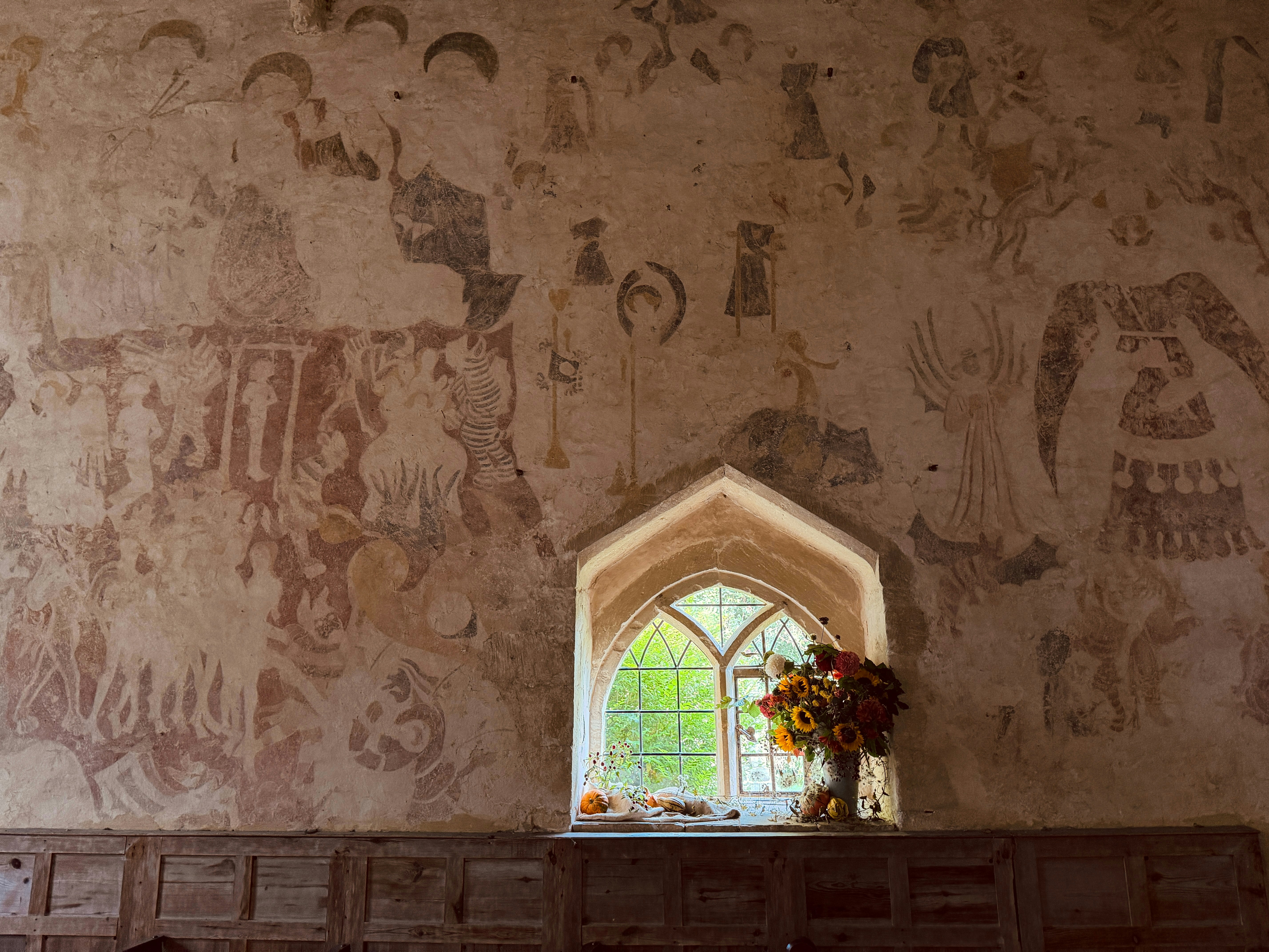 Sunlit Altar Window with Frescoed Wall
