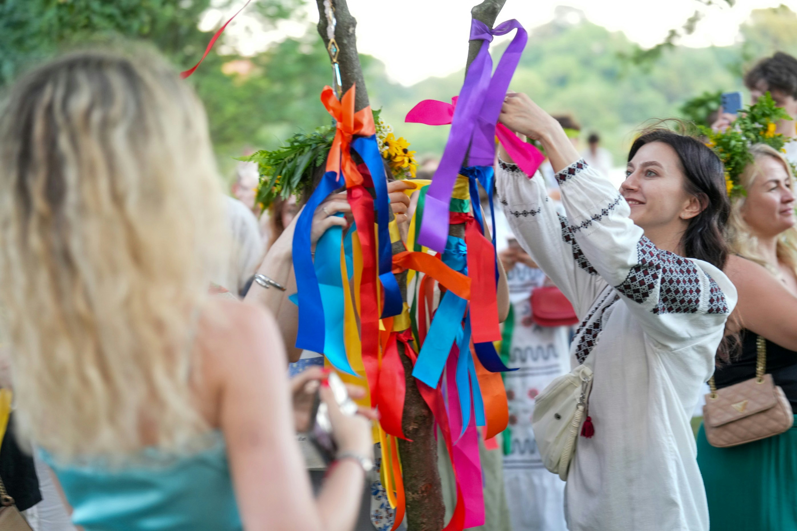 Ribbons of Celebration: Faces and Color in a Festive Moment