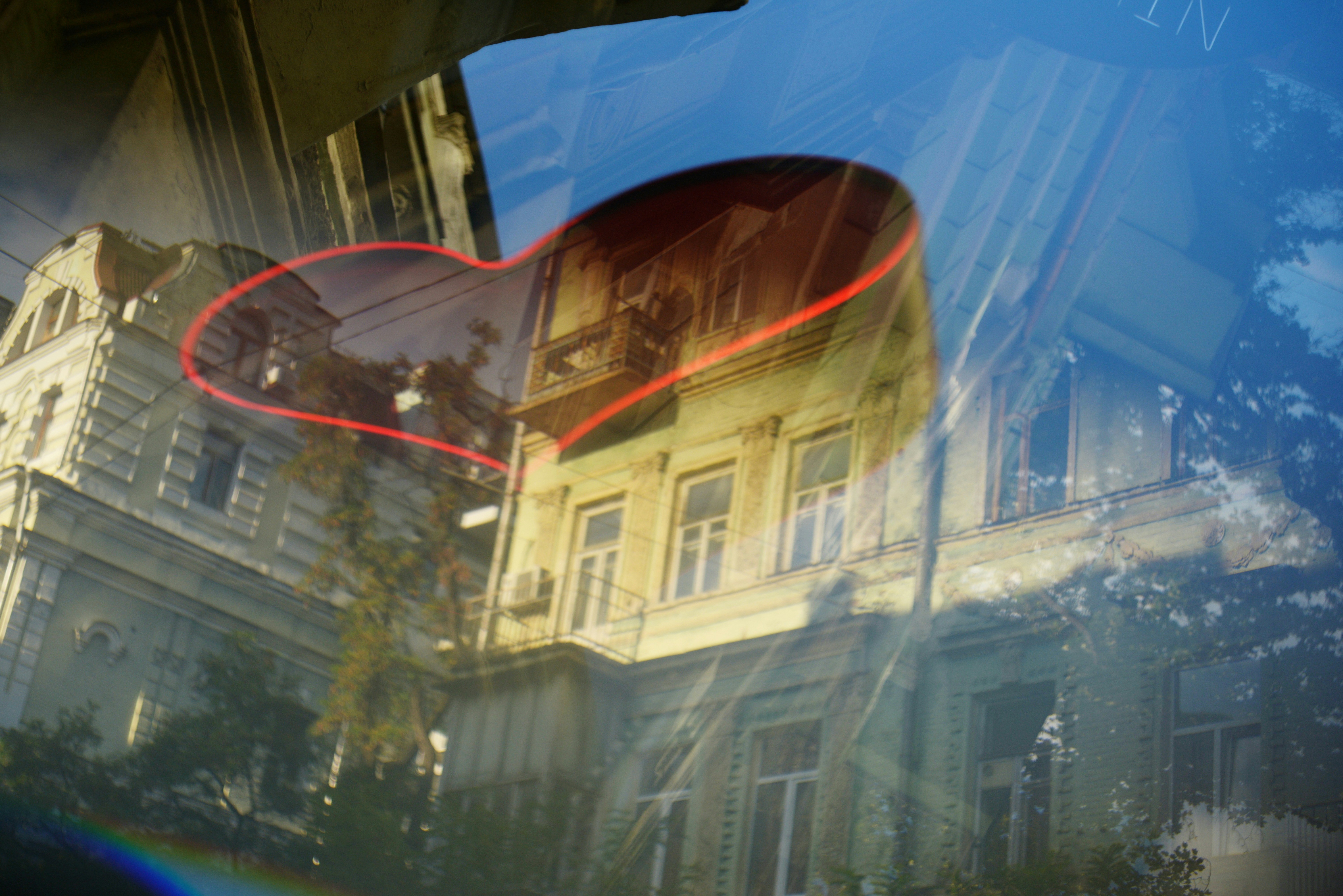 Heartlight in Glass: Reflections on a Historic Facade