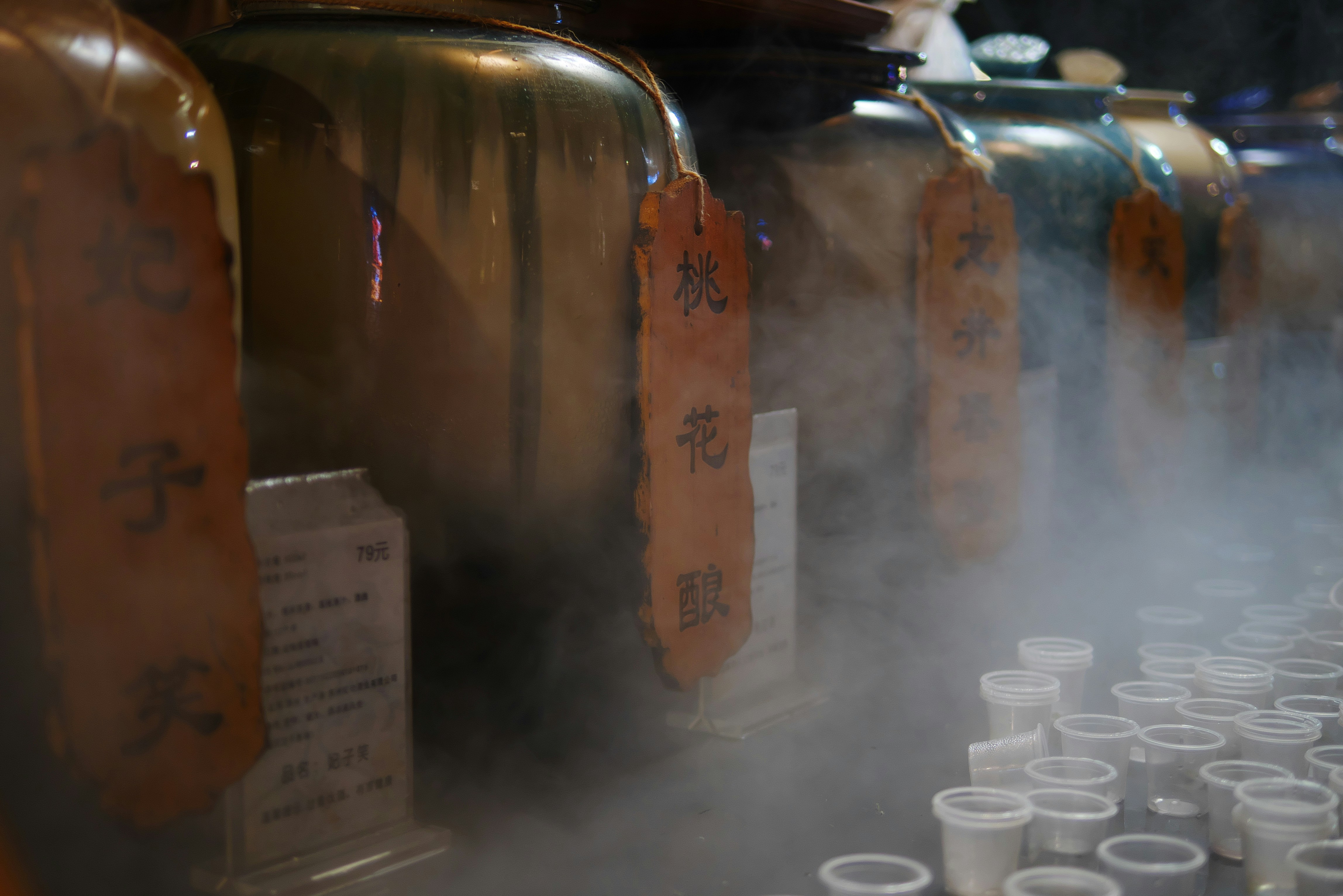 Steam and Soy: Row of Aging Jars in a Misty Market Cauldron