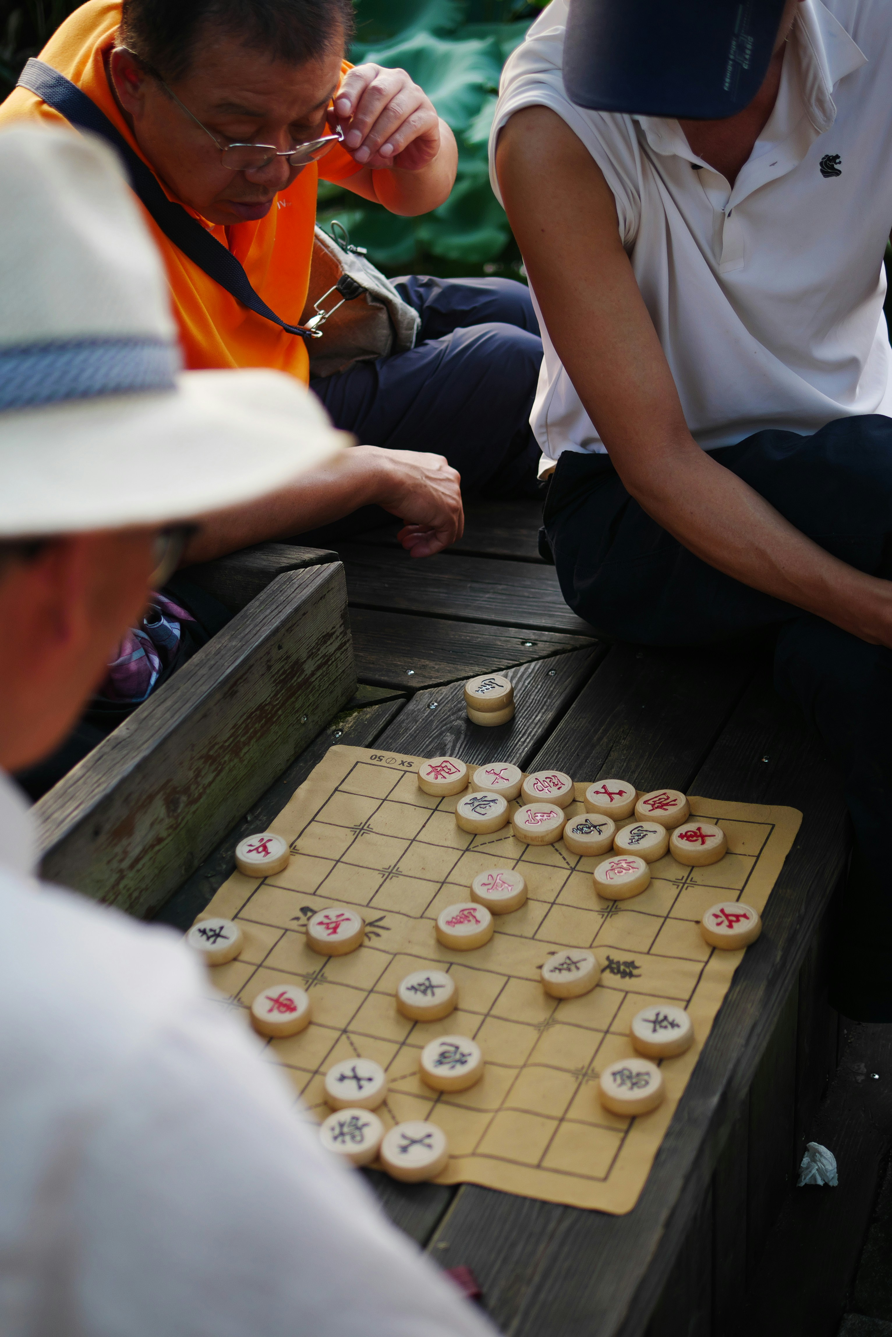 Board Game Pause: A Quiet Moment of Strategy on the Deck