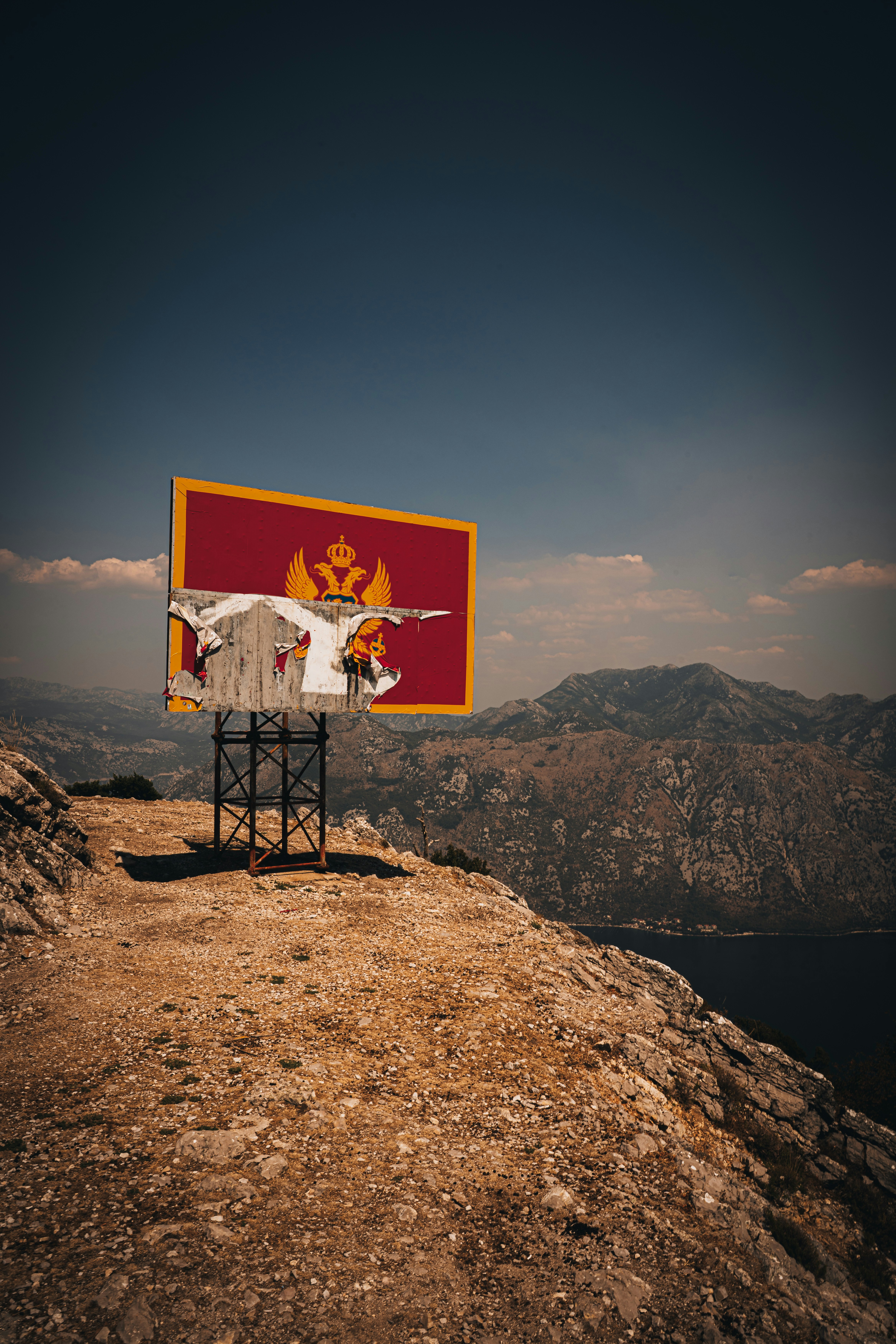 Borderline Billboard on a Cliff's Edge