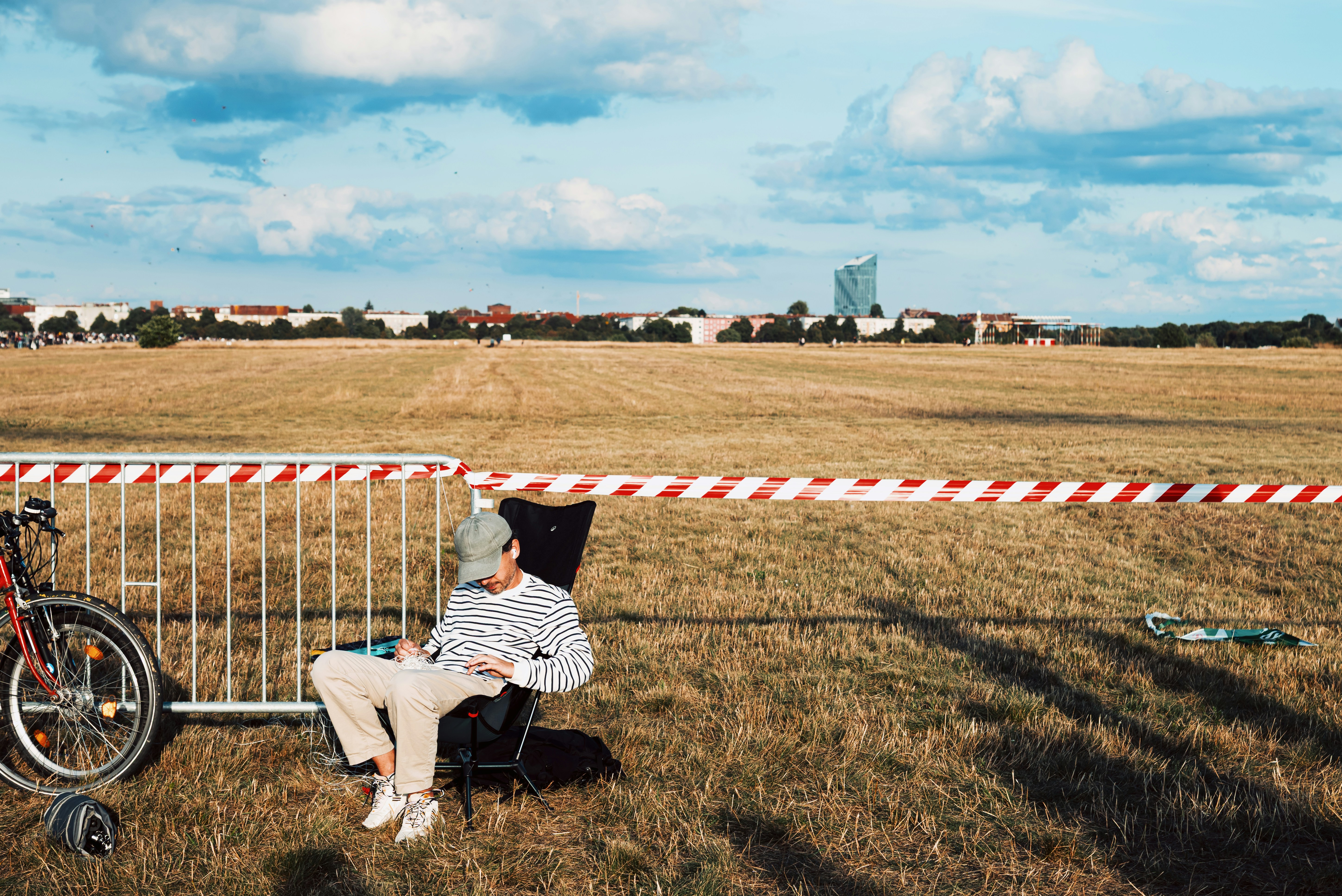 Fieldside Break: A Quiet Moment Under Open Skies