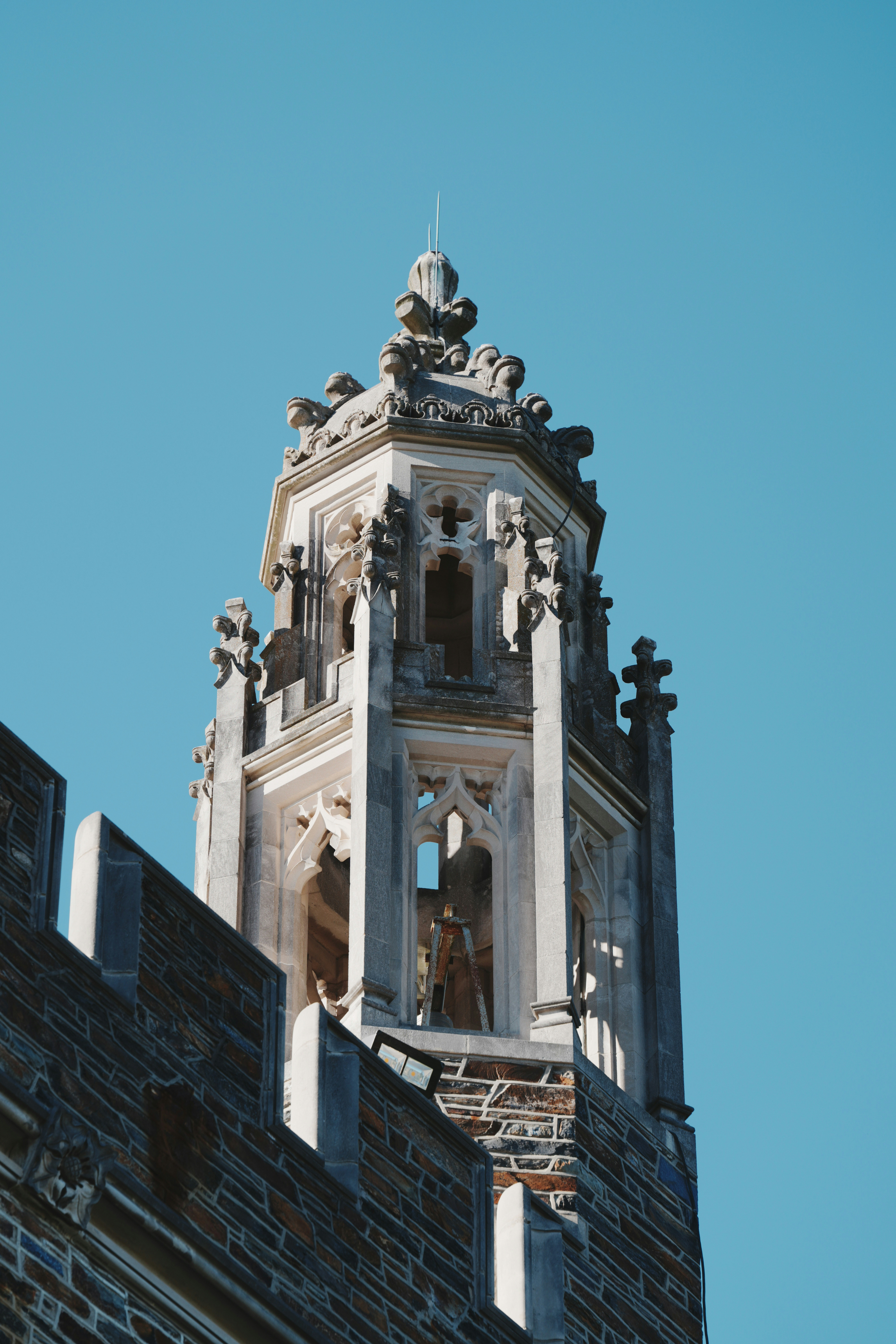 Gothic Turret Reaching Toward a Clear Sky