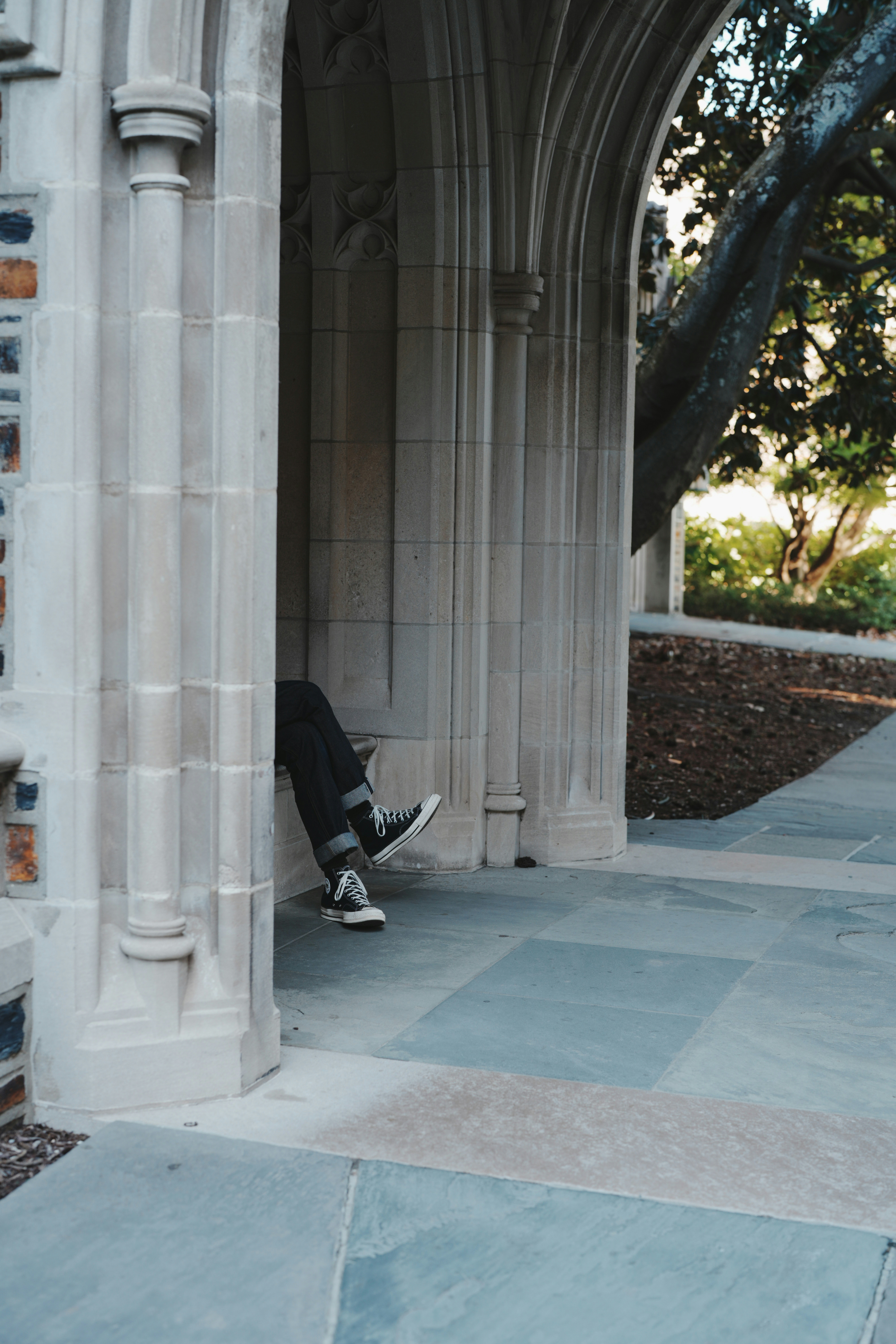 Hidden Footsteps: A Quiet Repose Behind the Cathedral Arch