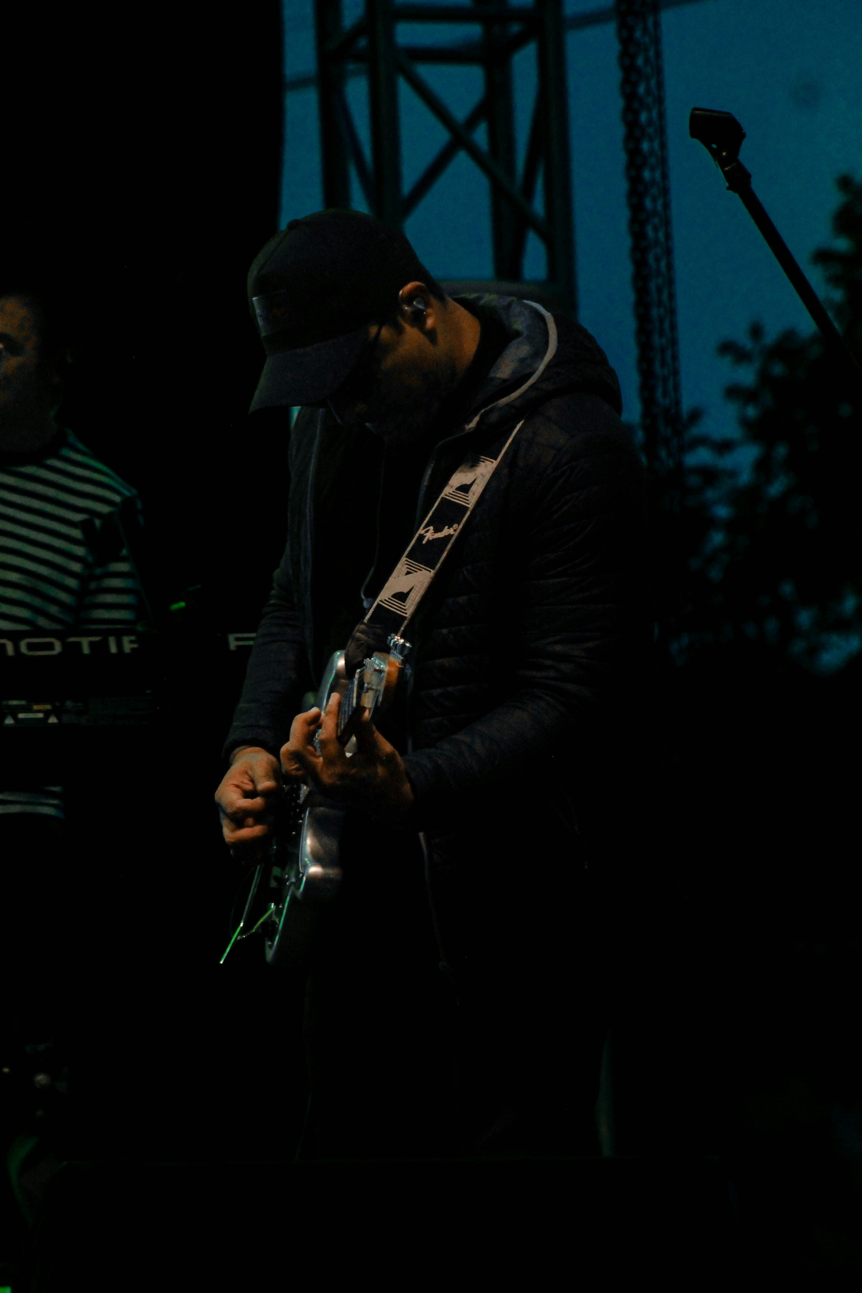 Midnight Strings: A Guitarist in Shadowed Focus