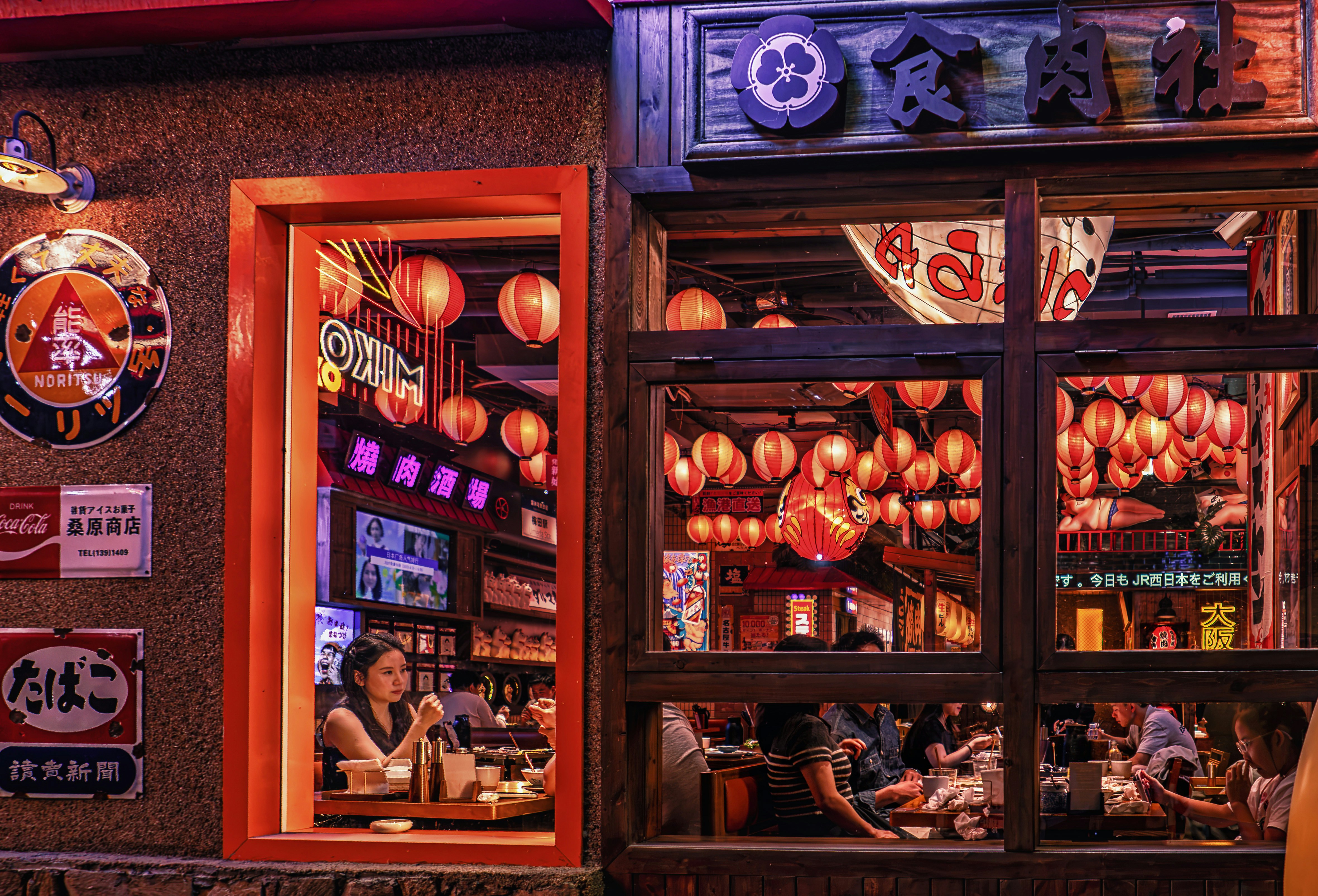 Red Lanterns and Neon Within a Packed Night Bazaar