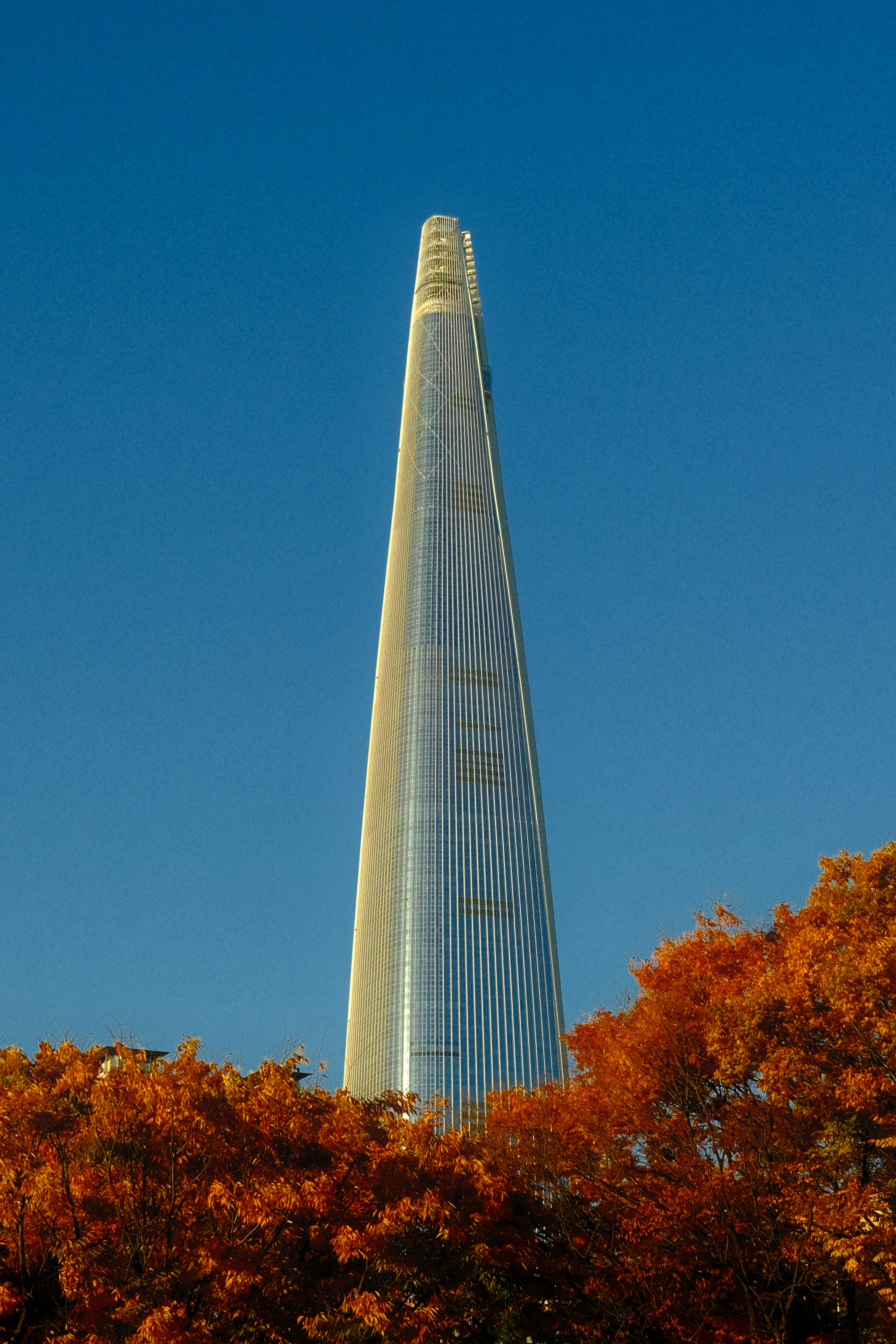 Skyscraper Piercing a Clear Autumn Sky