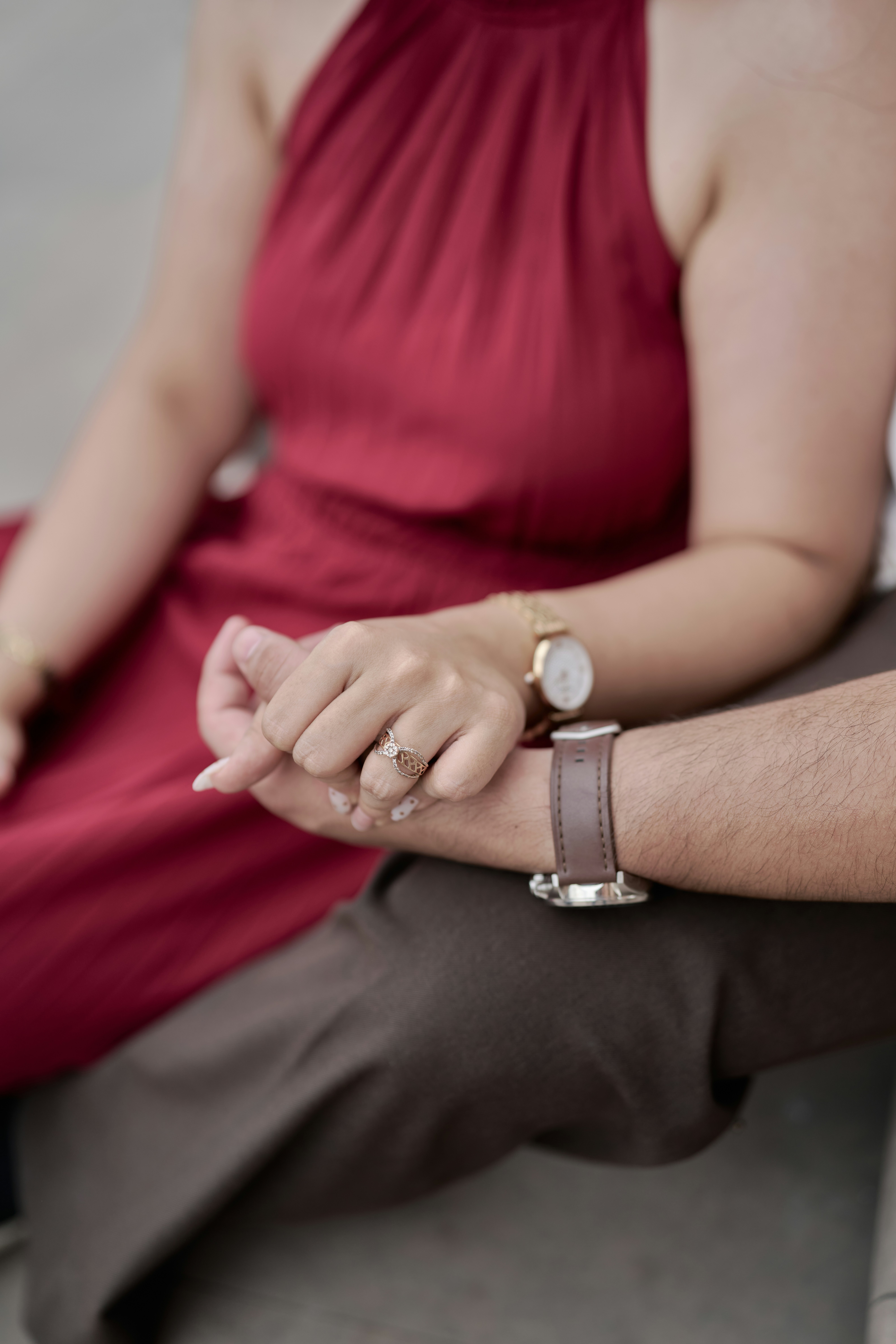 Interwoven Hands: Couple's Quiet Connection