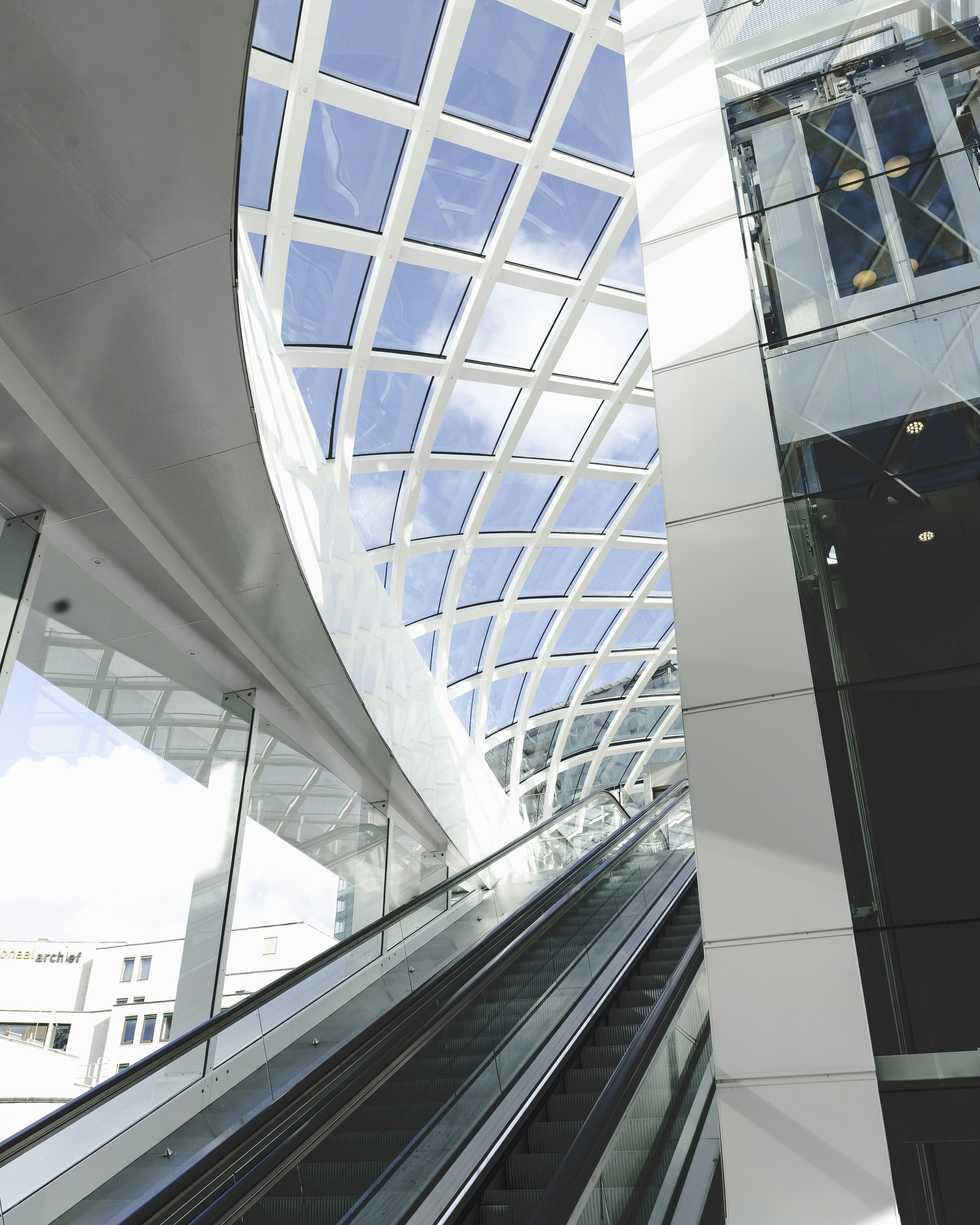 Glass Cathedral: an Ascending Corridor of Light and Steel