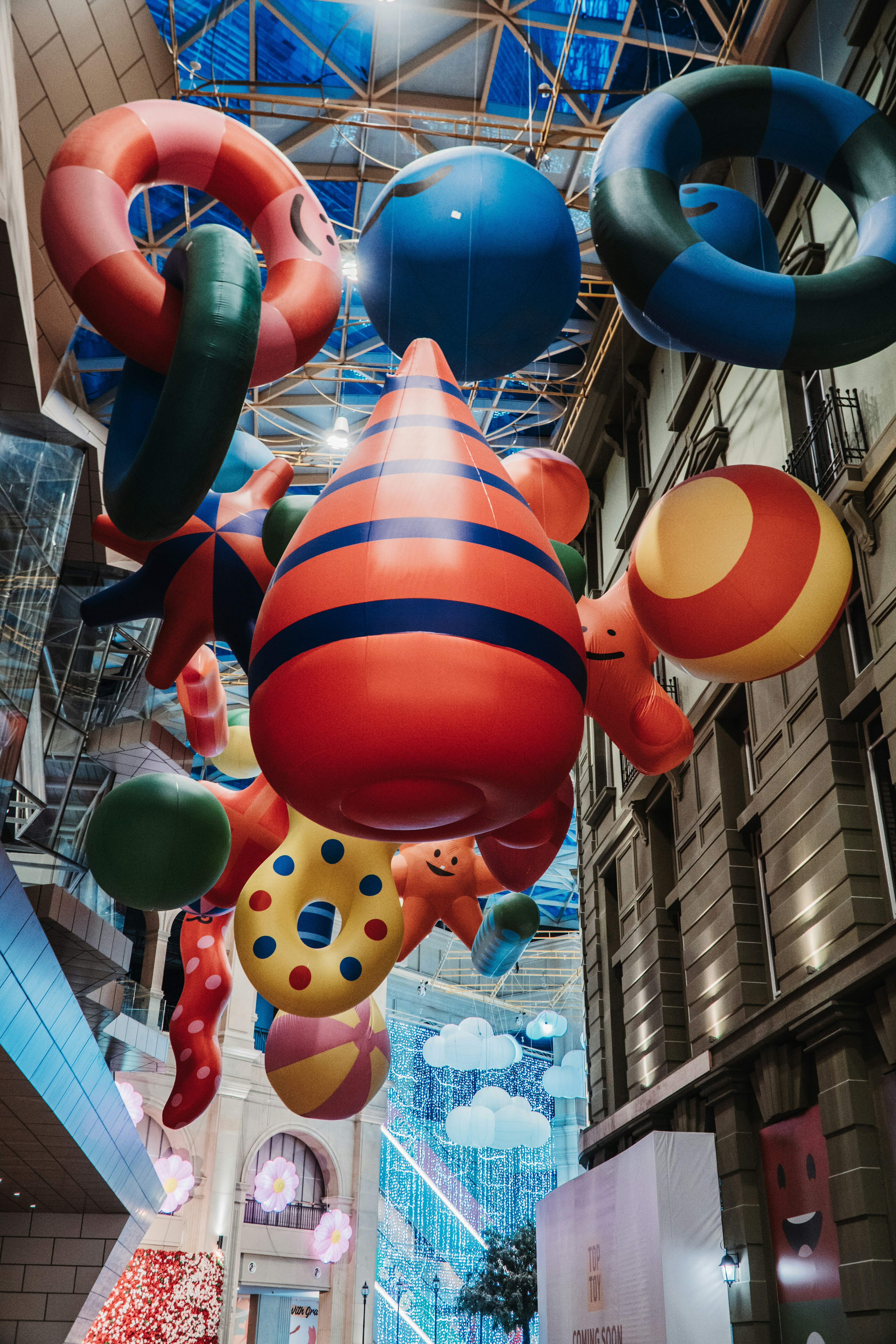 Floating Carnival in a City Atrium