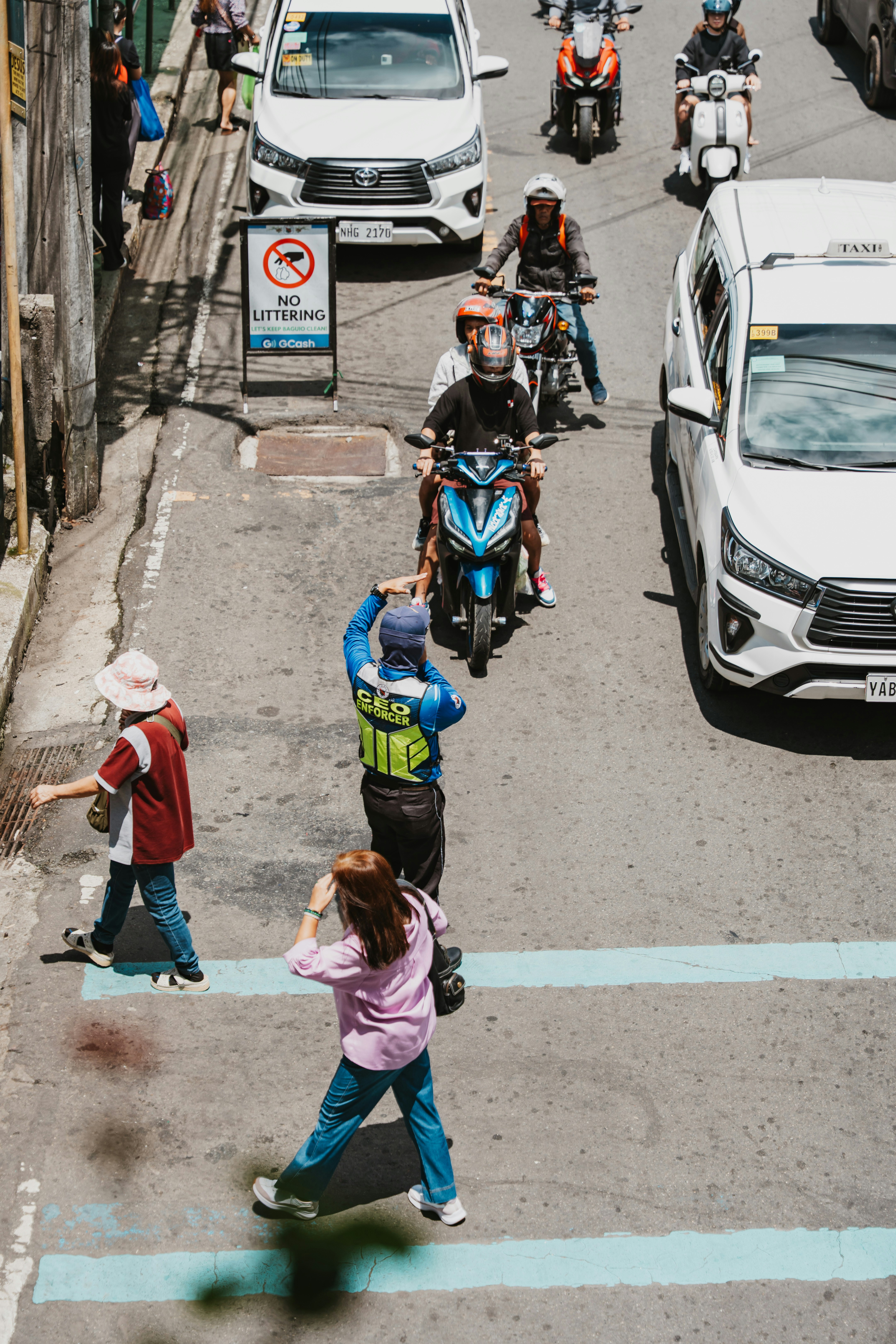 Crossing Gate: A Street Scene of Traffic, Nerves, and Striding Pedestrians