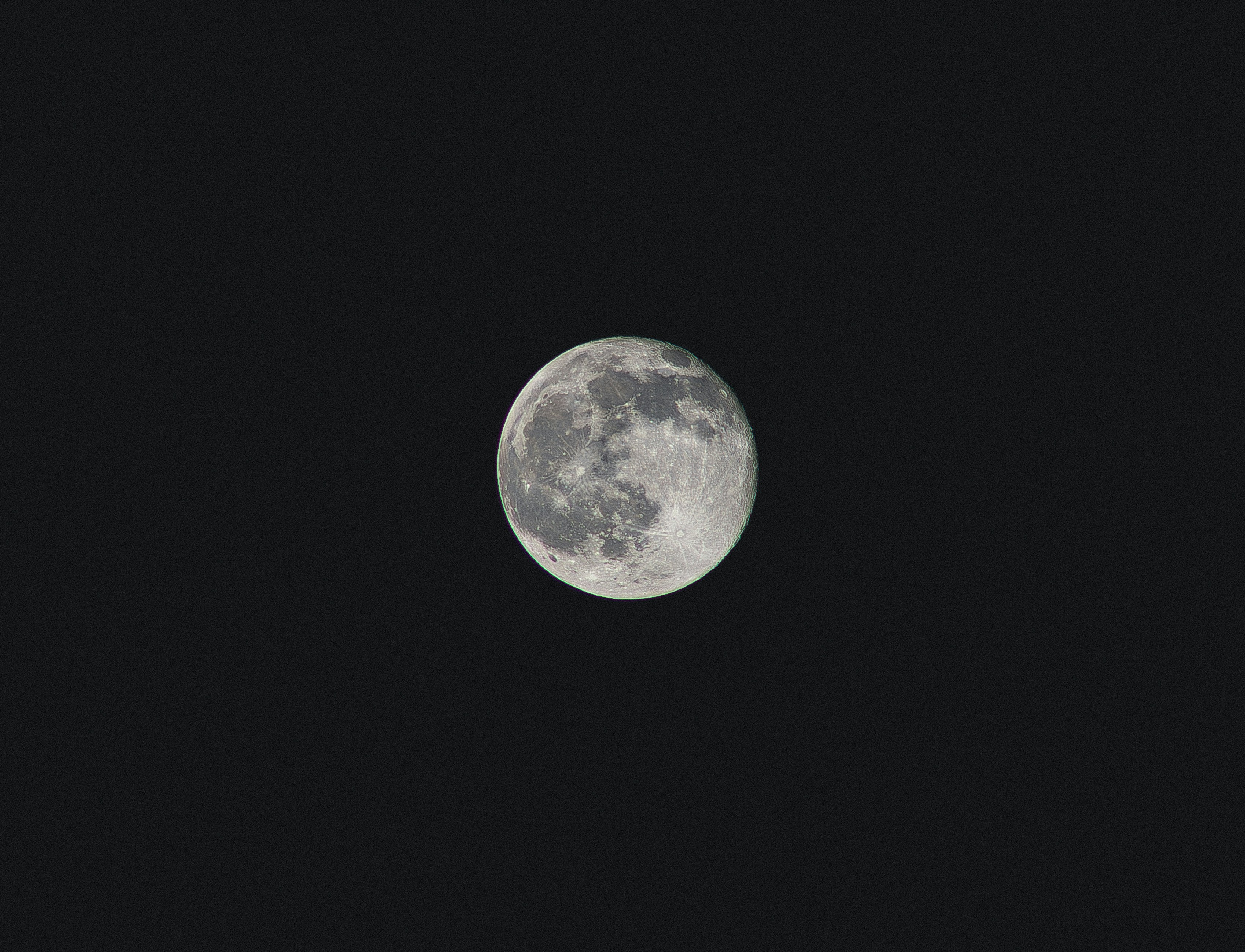 Moonlit Sphere: A Crisp Crescent in a Velvet Night