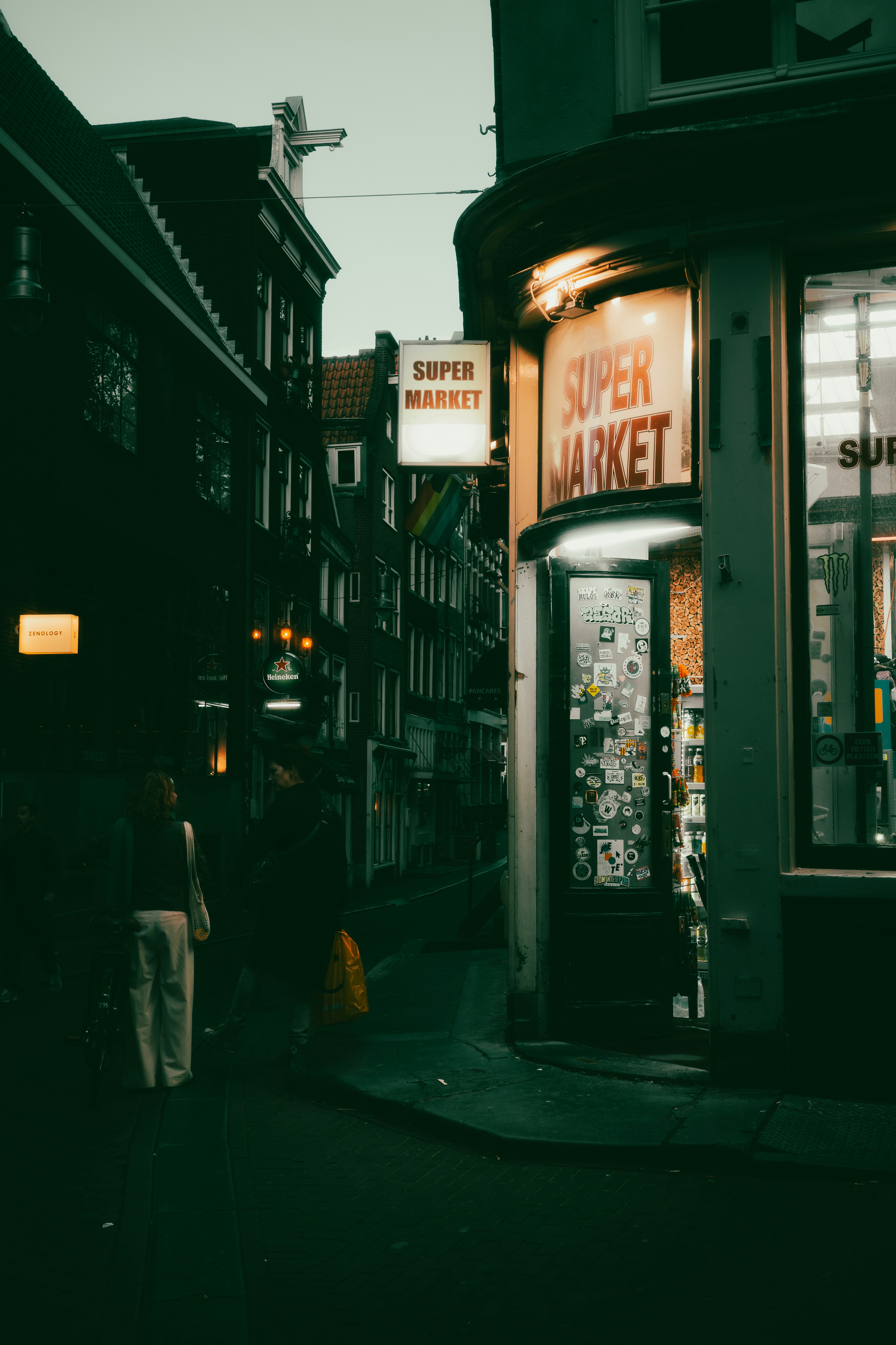 Neon Corner: Super Market Glow Amid Narrow Streets