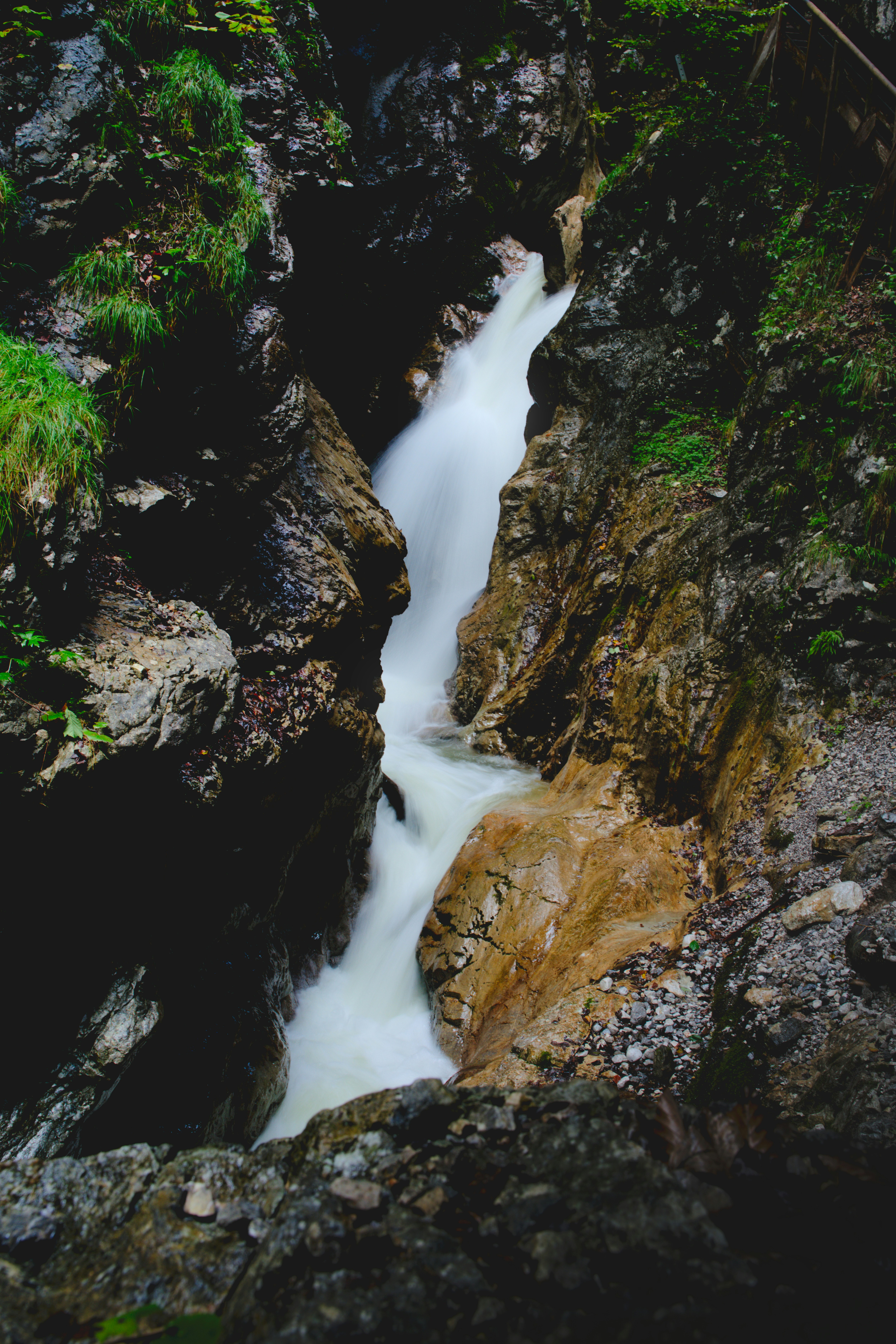 Hidden Cascade: White Ribbon Through Rugged Stone