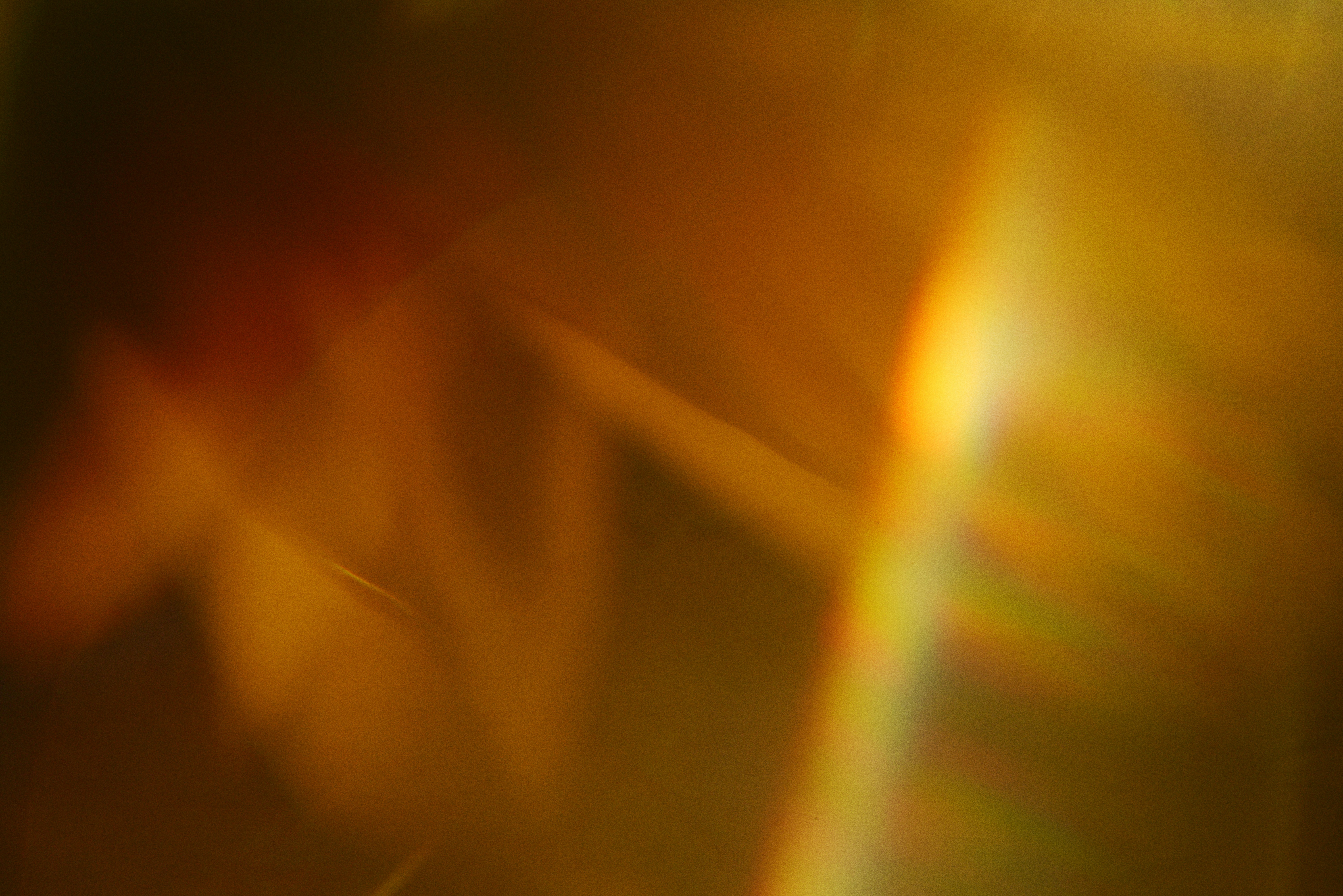 Aurora of Glass: Soft Golden Light through Hazy Prism