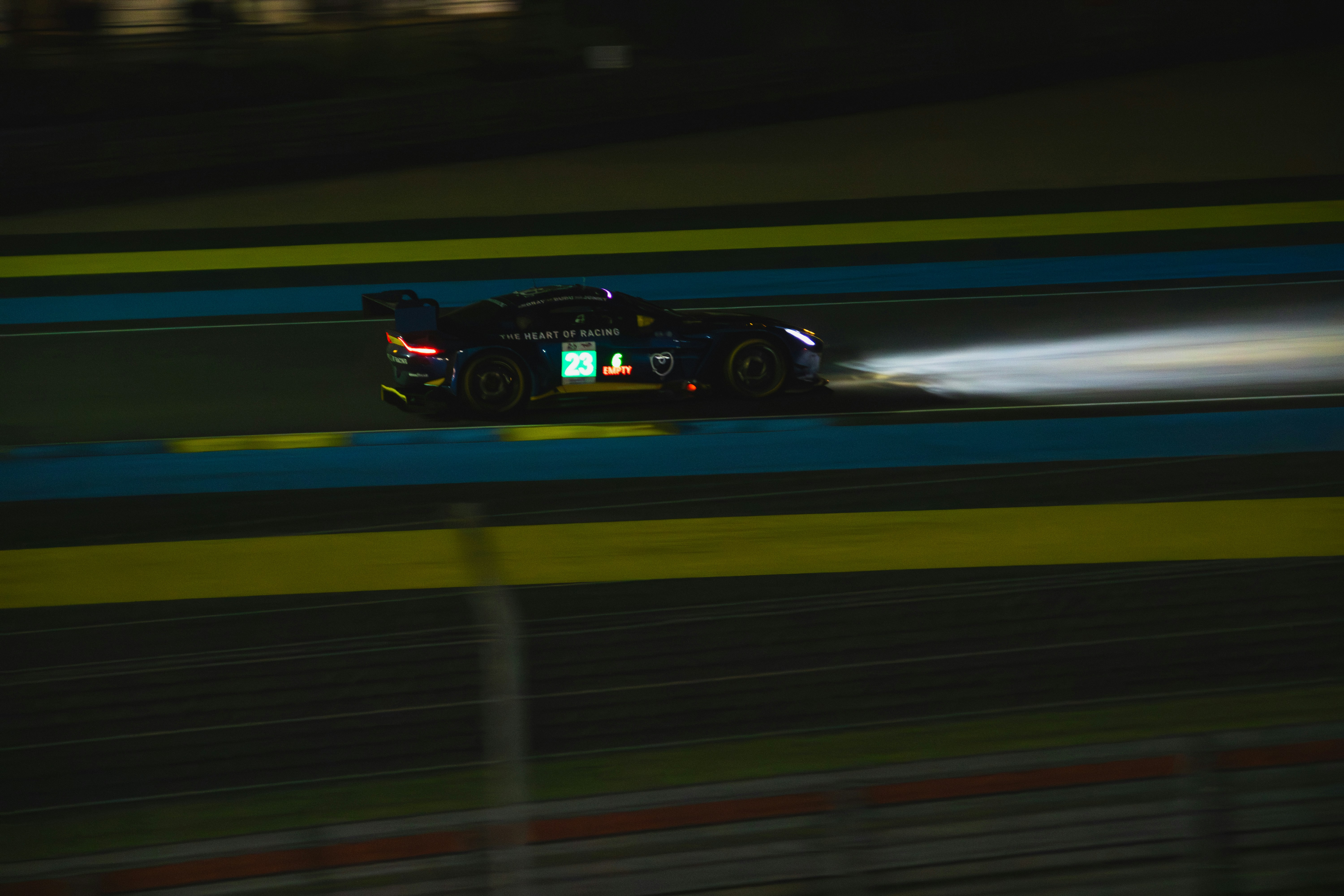 Midnight Meteor: A Racecar Rips Through Neon Night