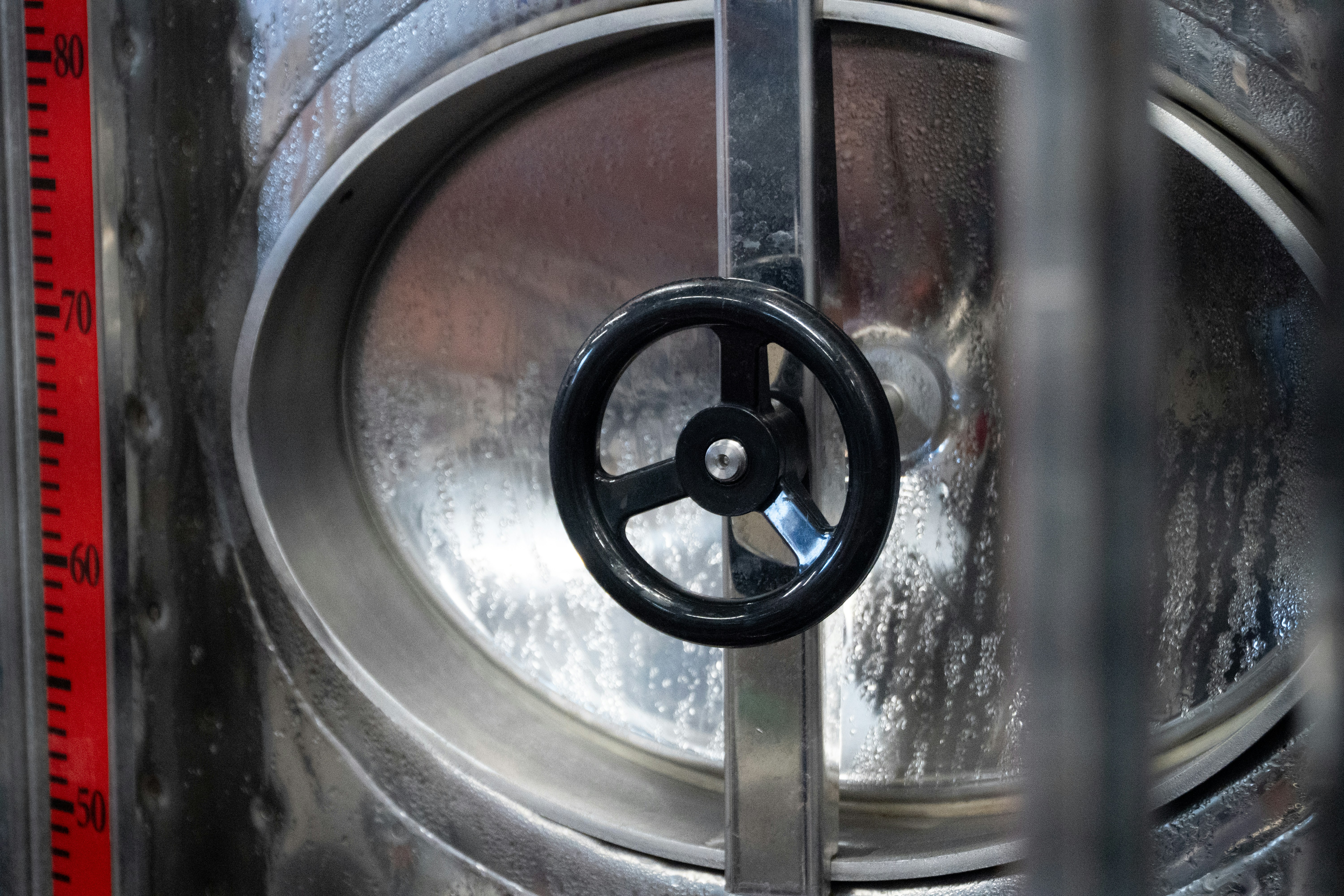 Dial of Focus: A Close-Up on the Valve Wheel in a Locked Mechanism