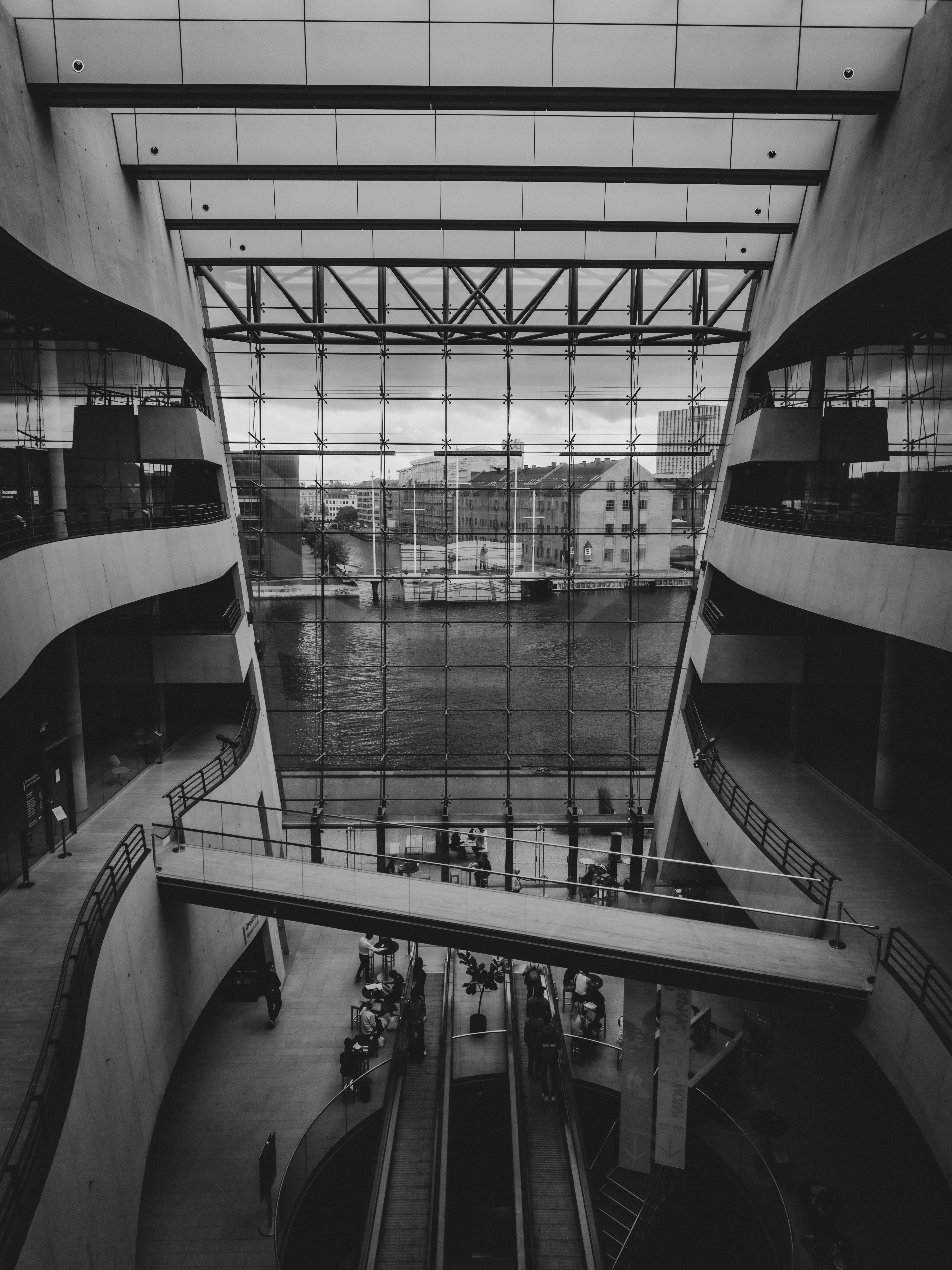 Symmetry Across Glass: An Atrium’s Quiet Movement