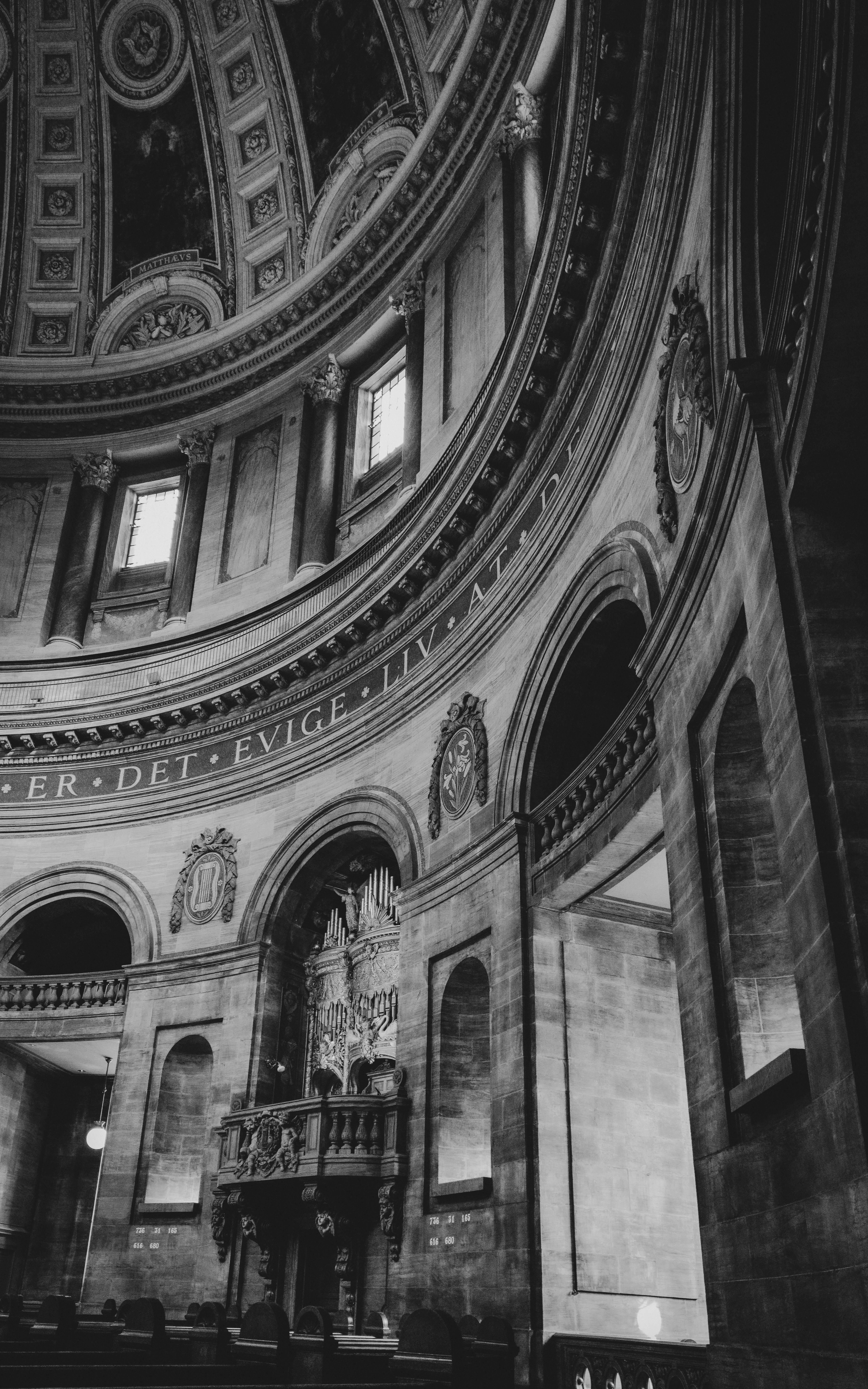 Cathedral Interior in Dim Monochrome: Arch, Ellipses, and Altar Space