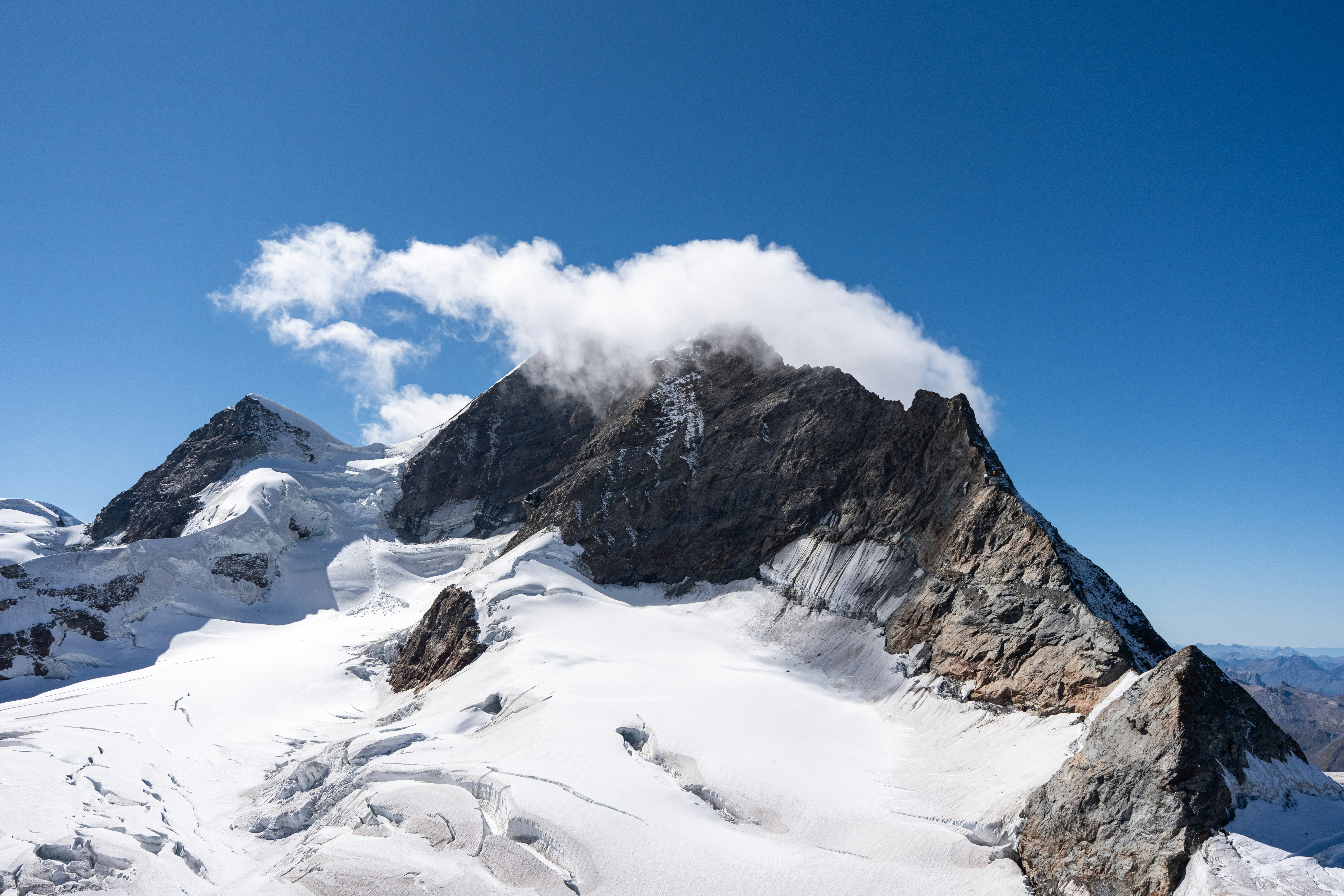 Snow-crowned Peak Under a Clear Blue Sky