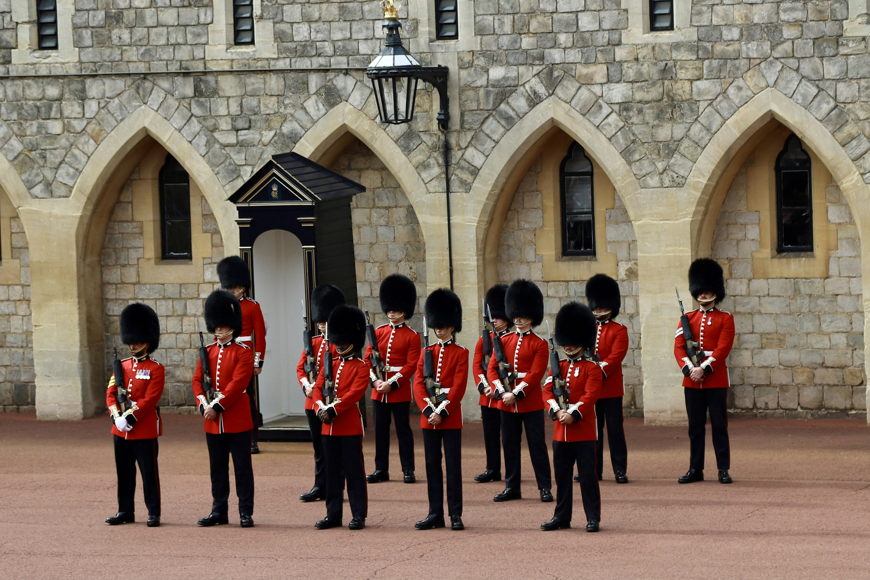 Line of Scarlet Guards at the Courtyard Gate
