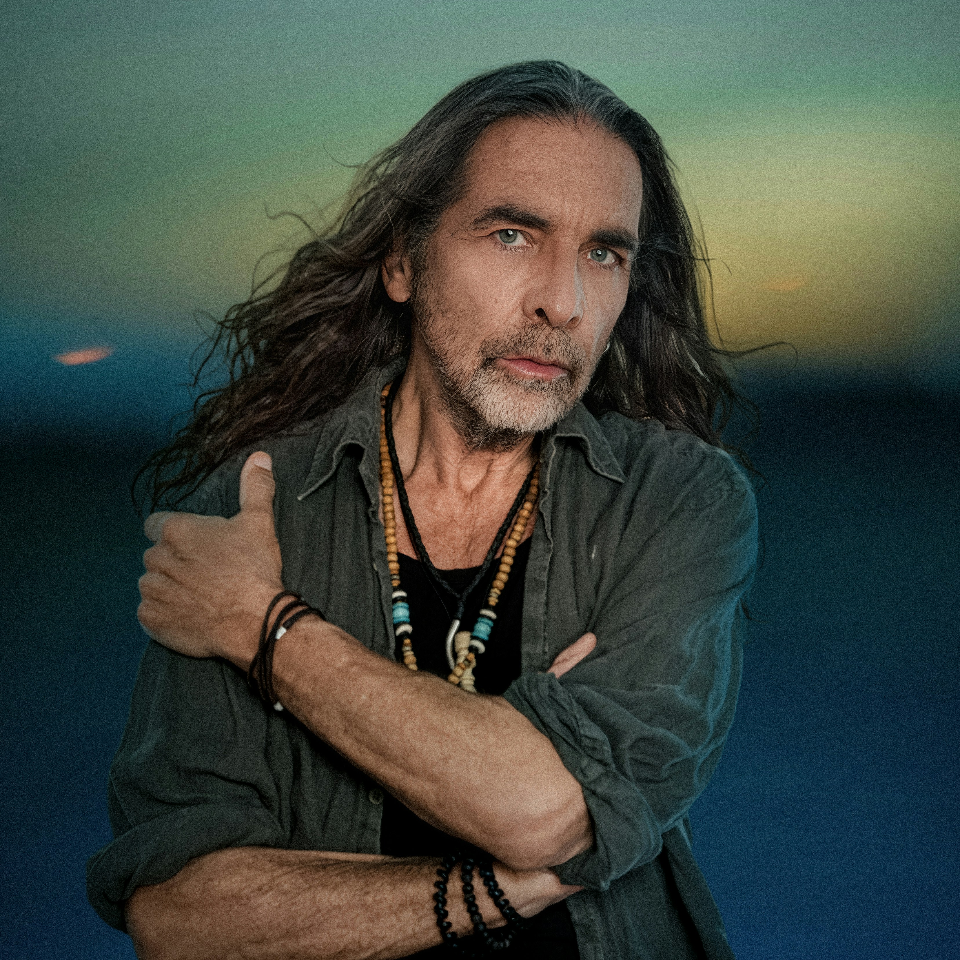 Seafront Sage: A Weathered Portrait in Sunset Light