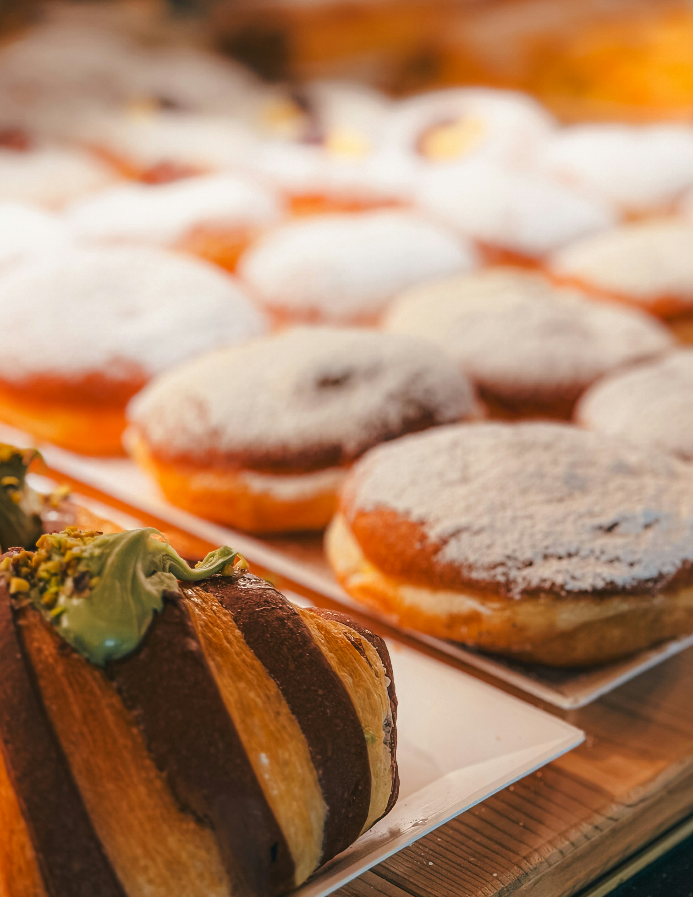 Sugared Serendipity: A Tray of Powdered Donuts with a Chocolate-Glazed Pass