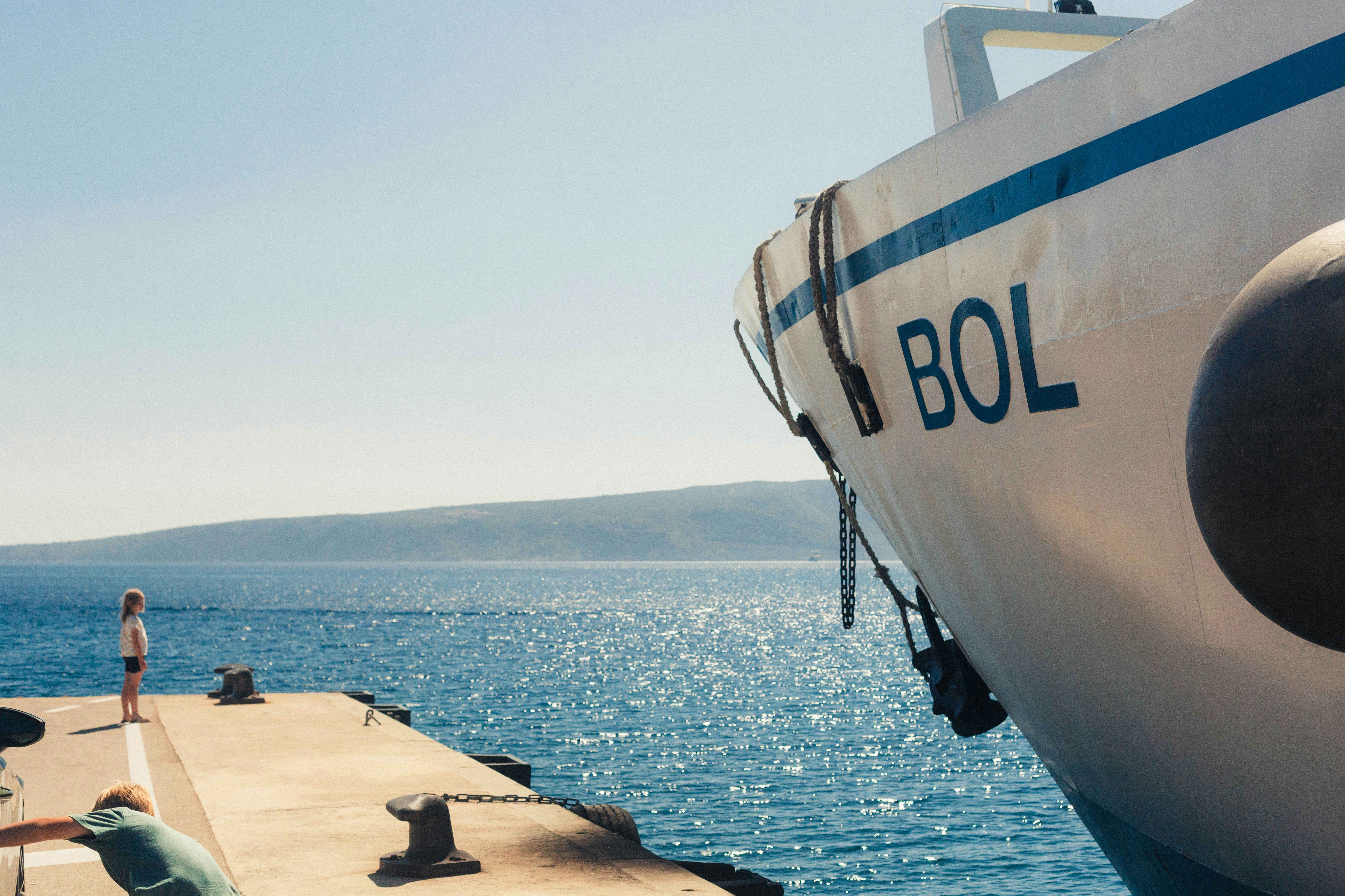 Boat at the Edge: A Quiet Harbor Daring the Horizon