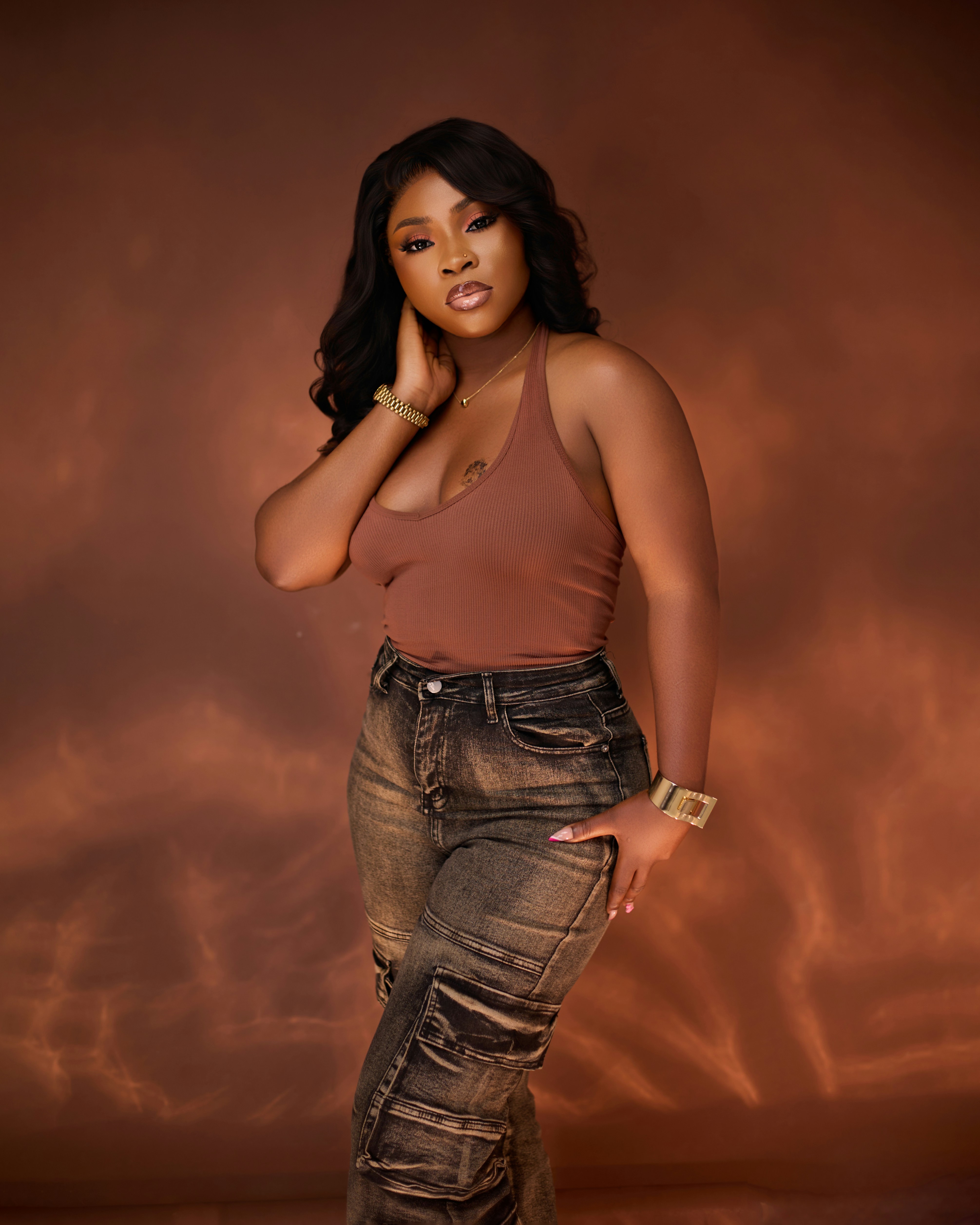 Warm-toned portrait: confidence and glow in a copper studio