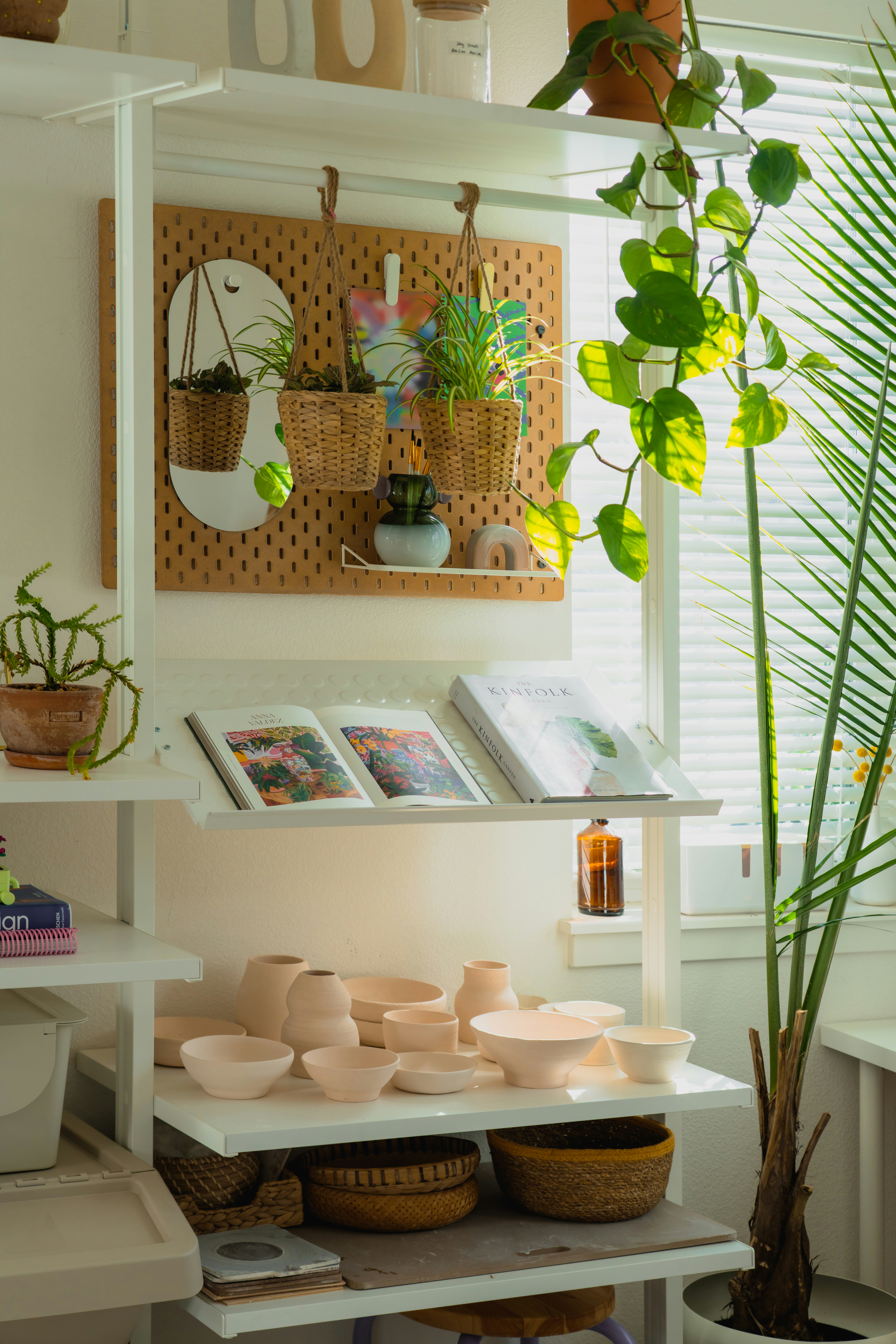 Greenery Gallery: A Sunlit Shelf of Plant Hangers and Ceramics