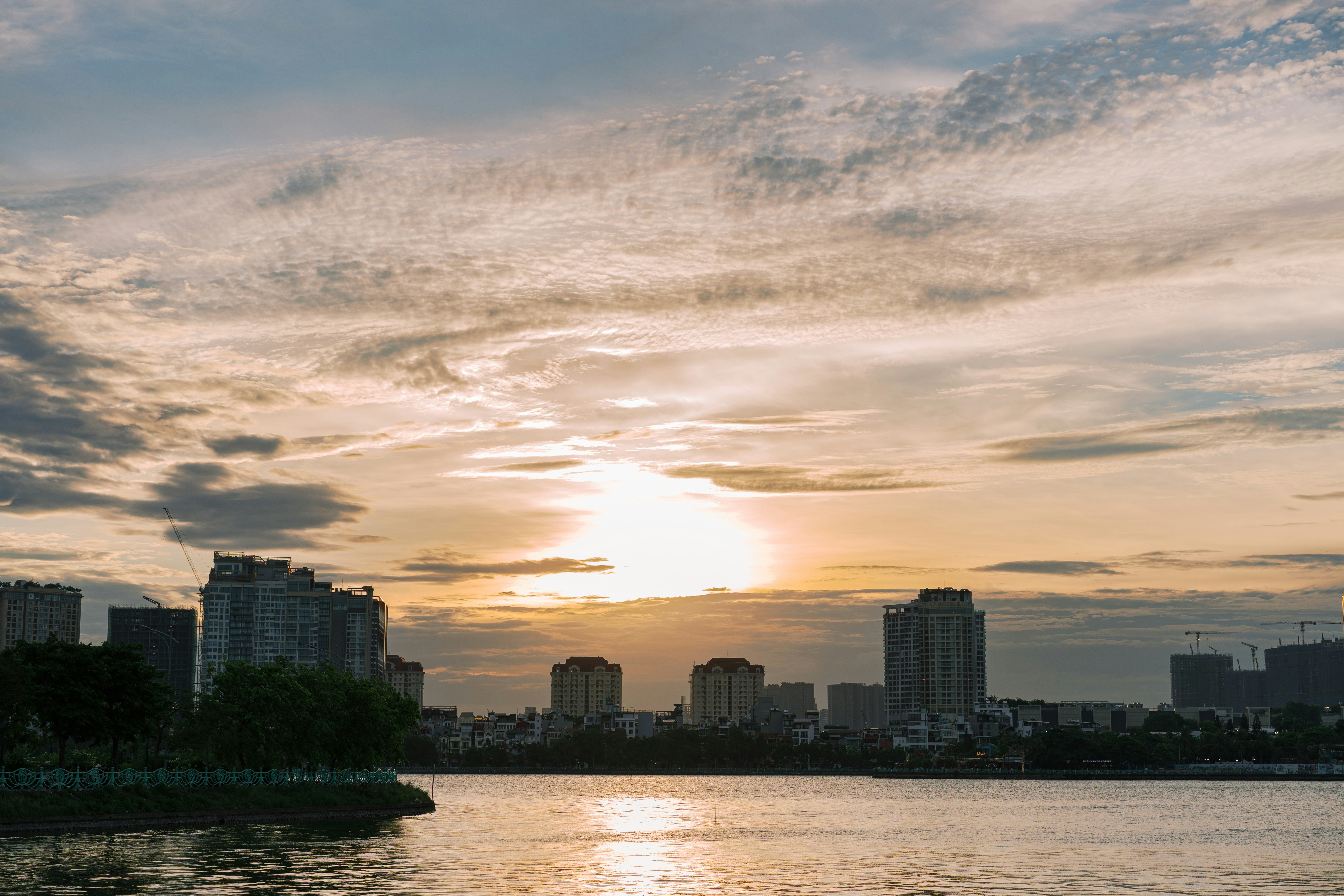 Sunlit River Skyline Beneath a Quiet Dawn