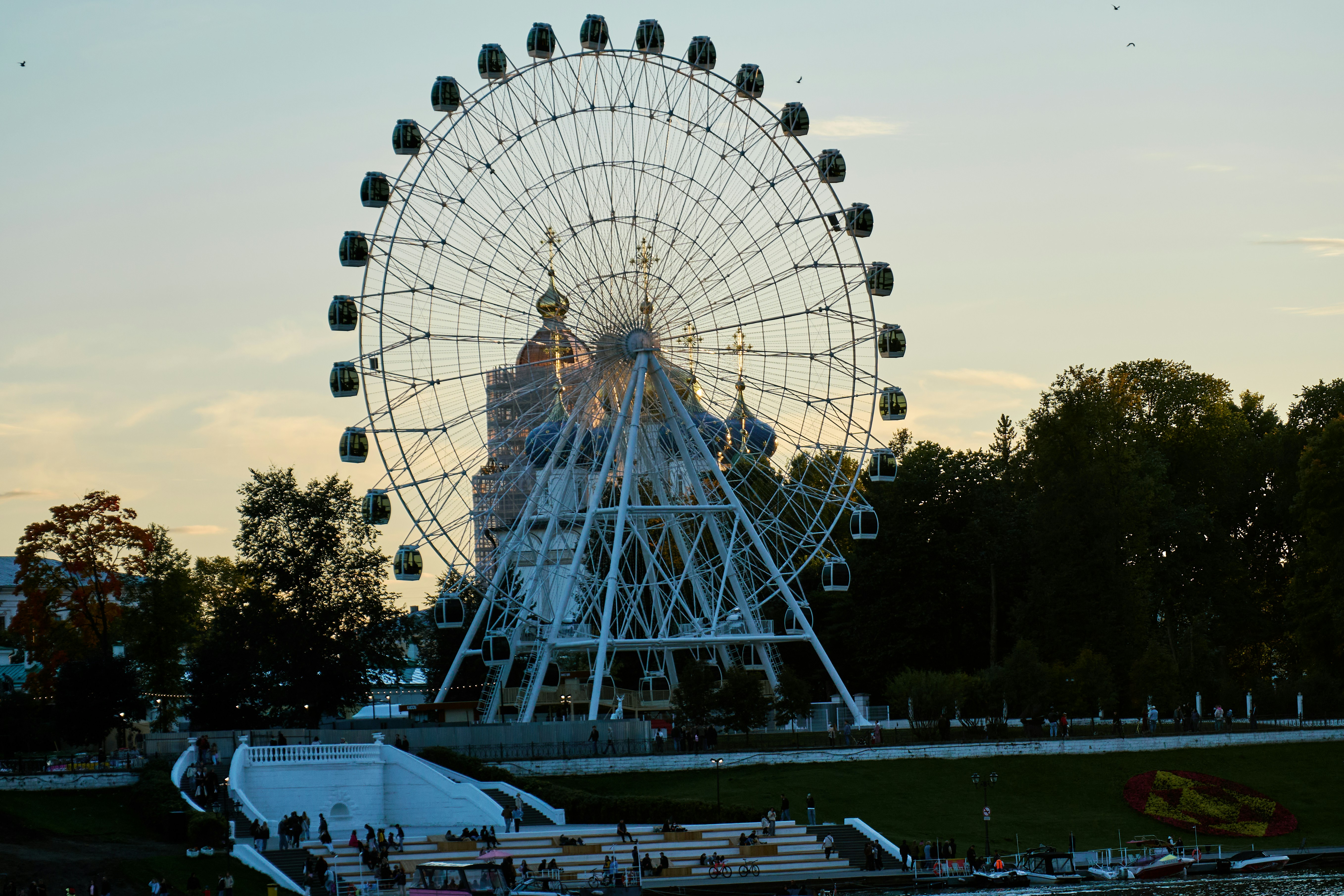 Midnight Wheel: A Quiet Glimmer Over the Riverside Park