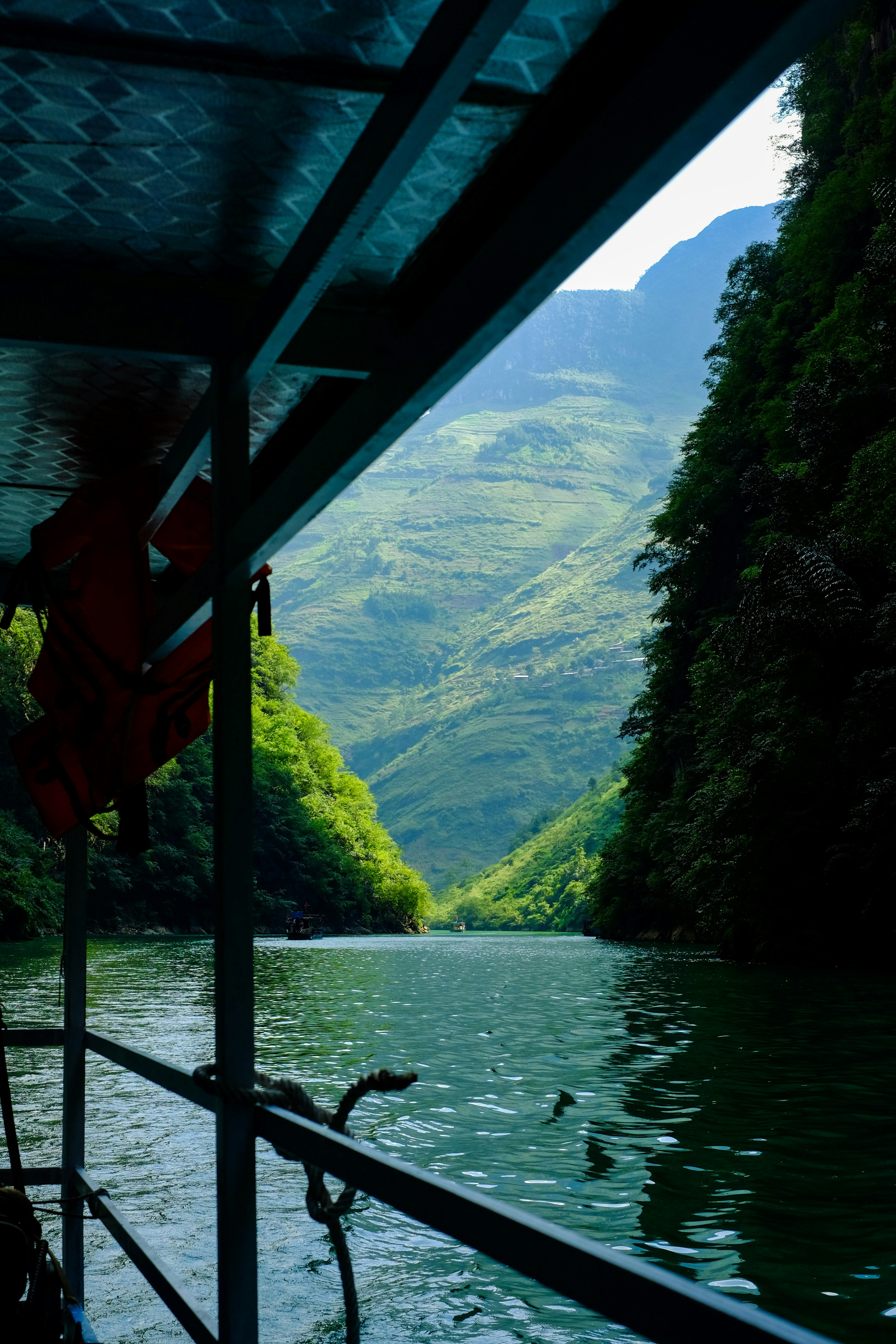 River Passage Under a Quiet Steel Roof