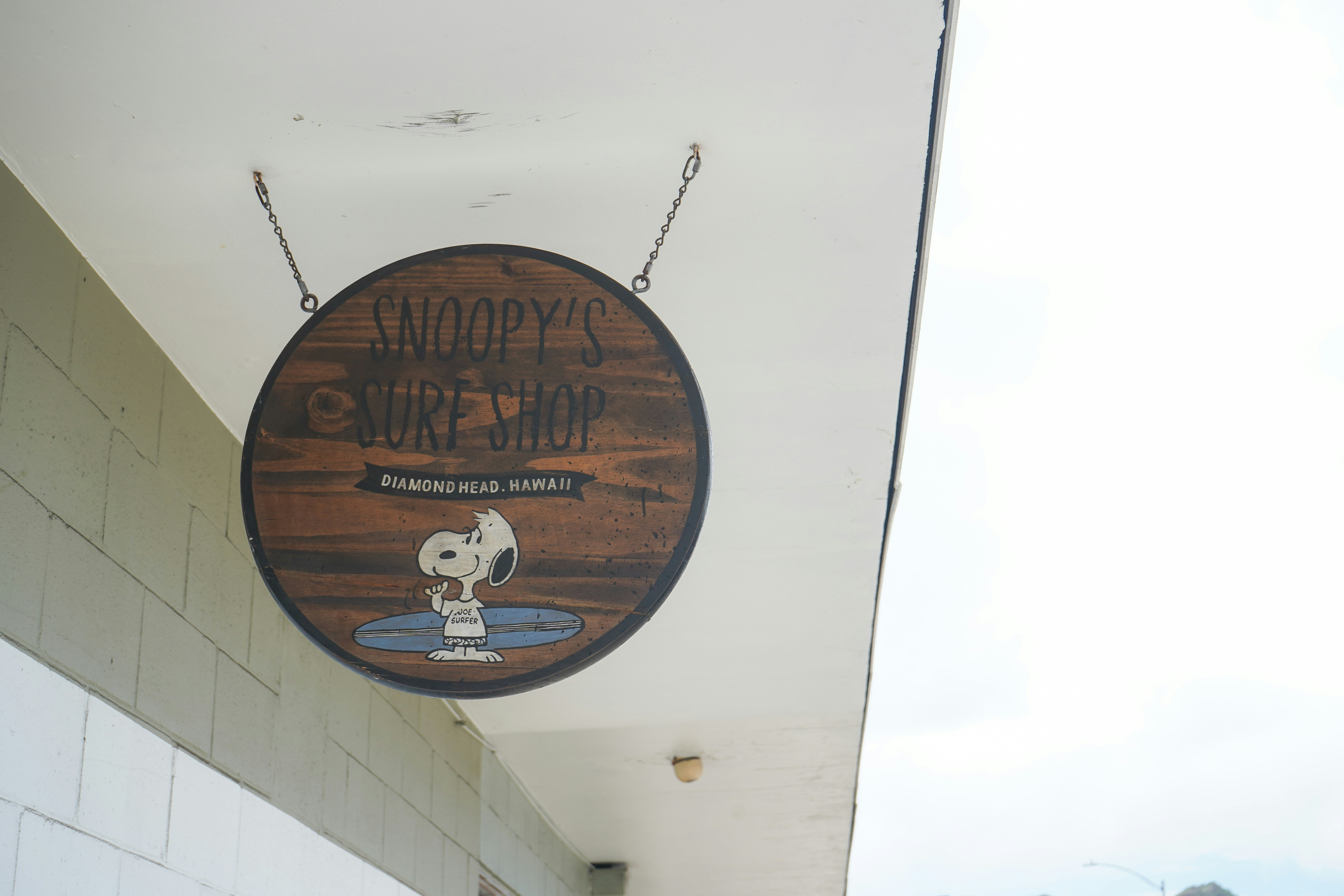 Circular Sign for Snoopy's Surf Shop, Diamond Head Hawaii