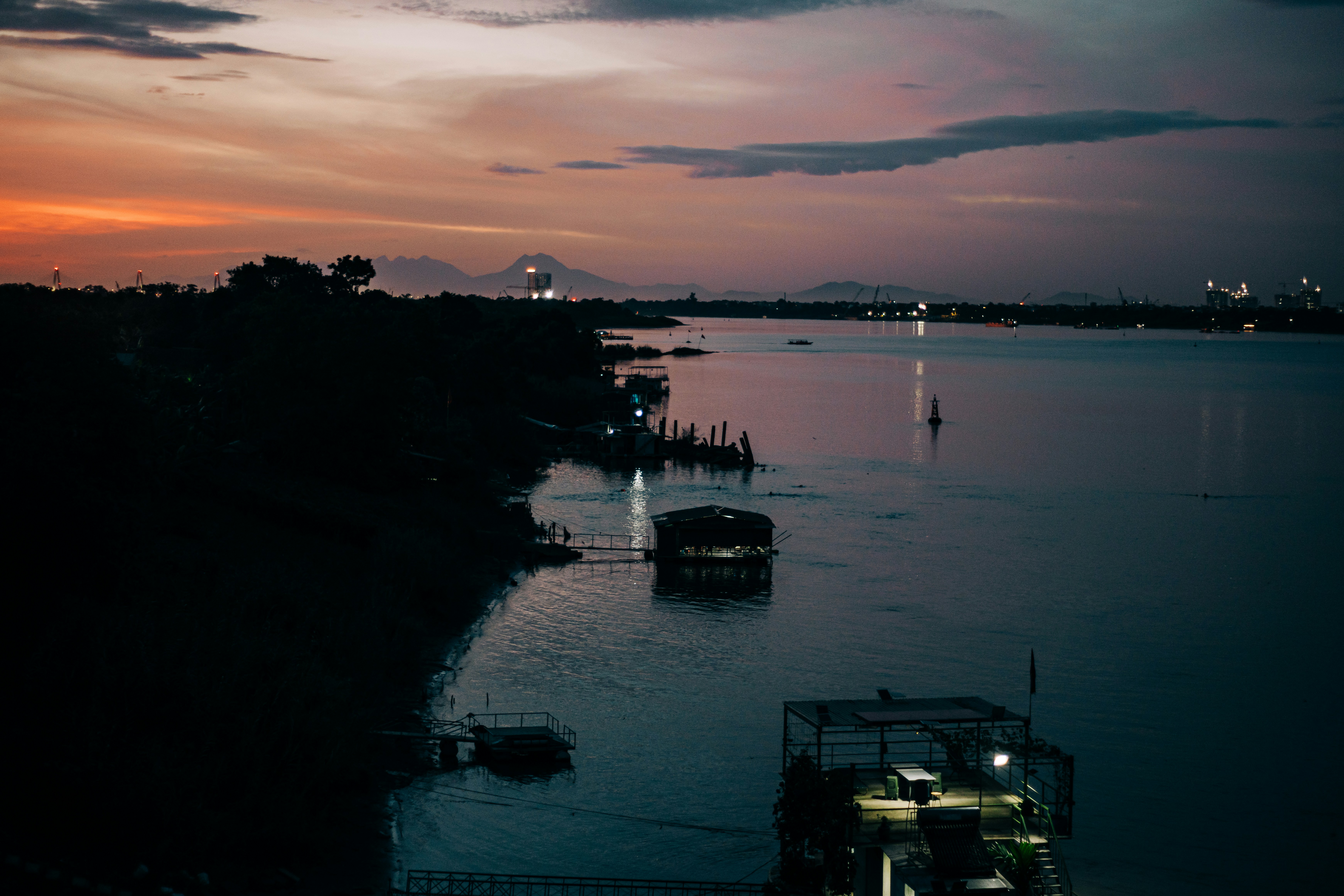 Sunset Dusk Over a Quiet Riverside Harbor