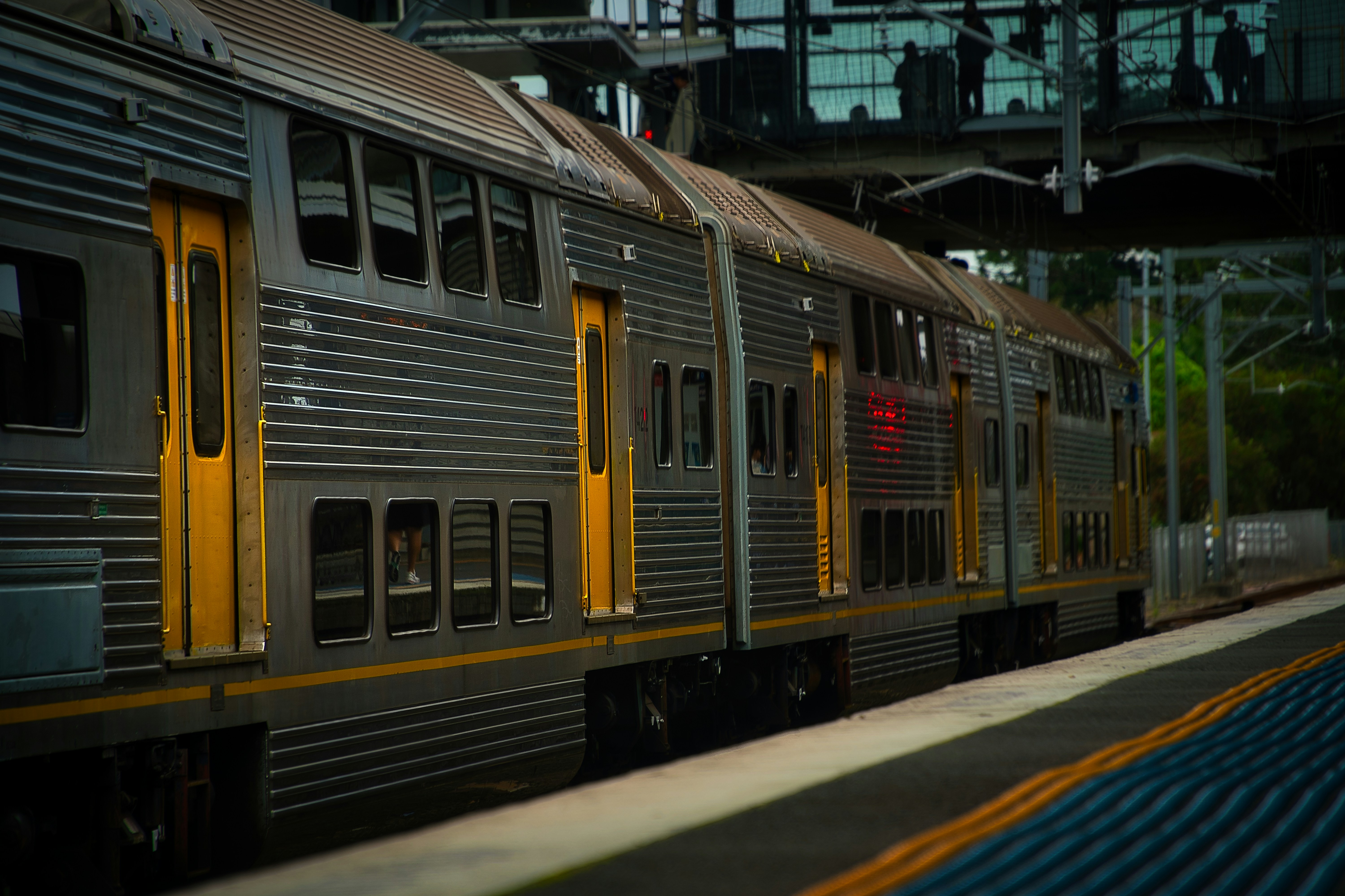 Golden Era of Commuter Steel: A Resting Train at Dusk Platform