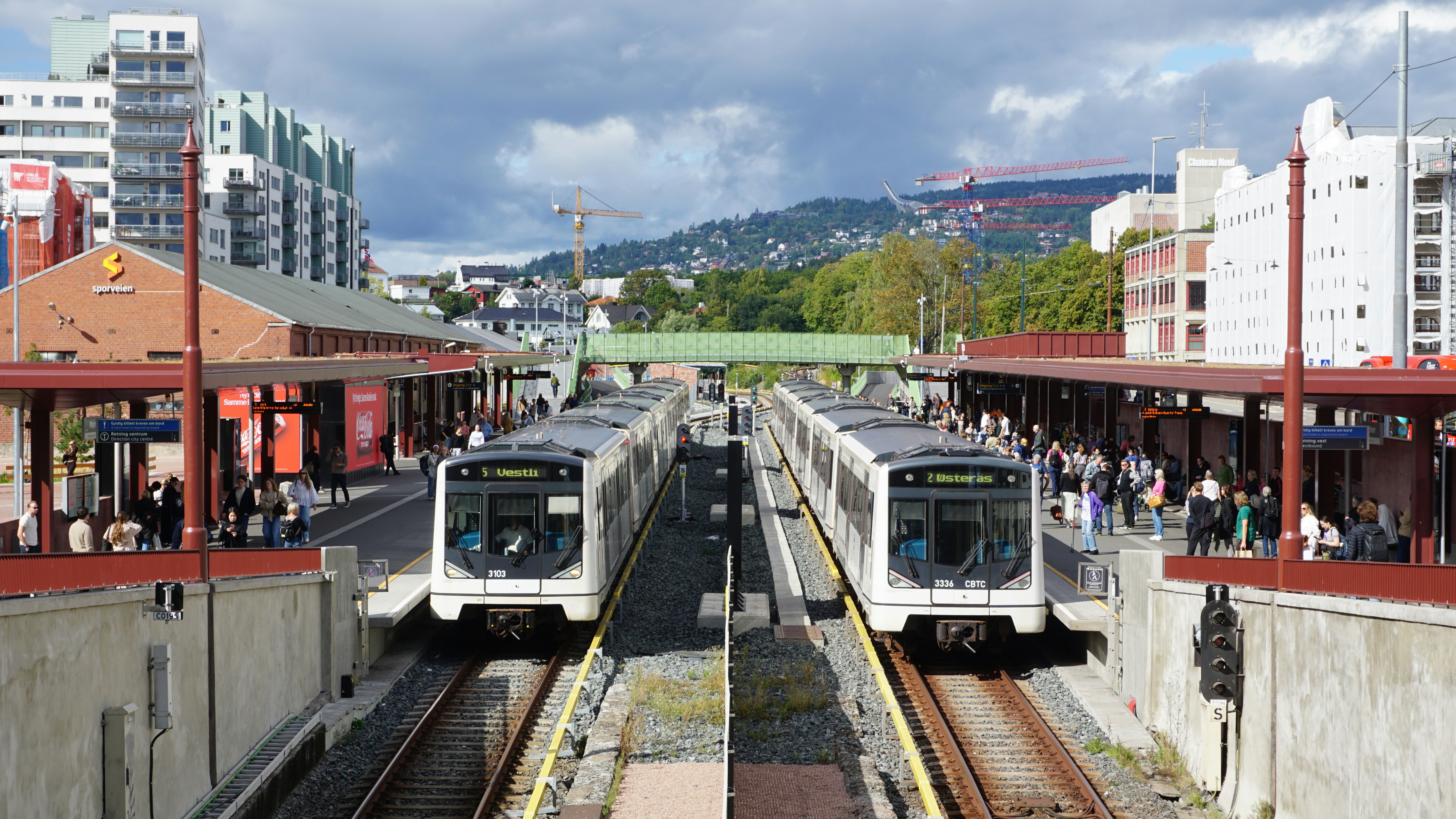 Twin Metro Trains Face Off Across a Central Canyon