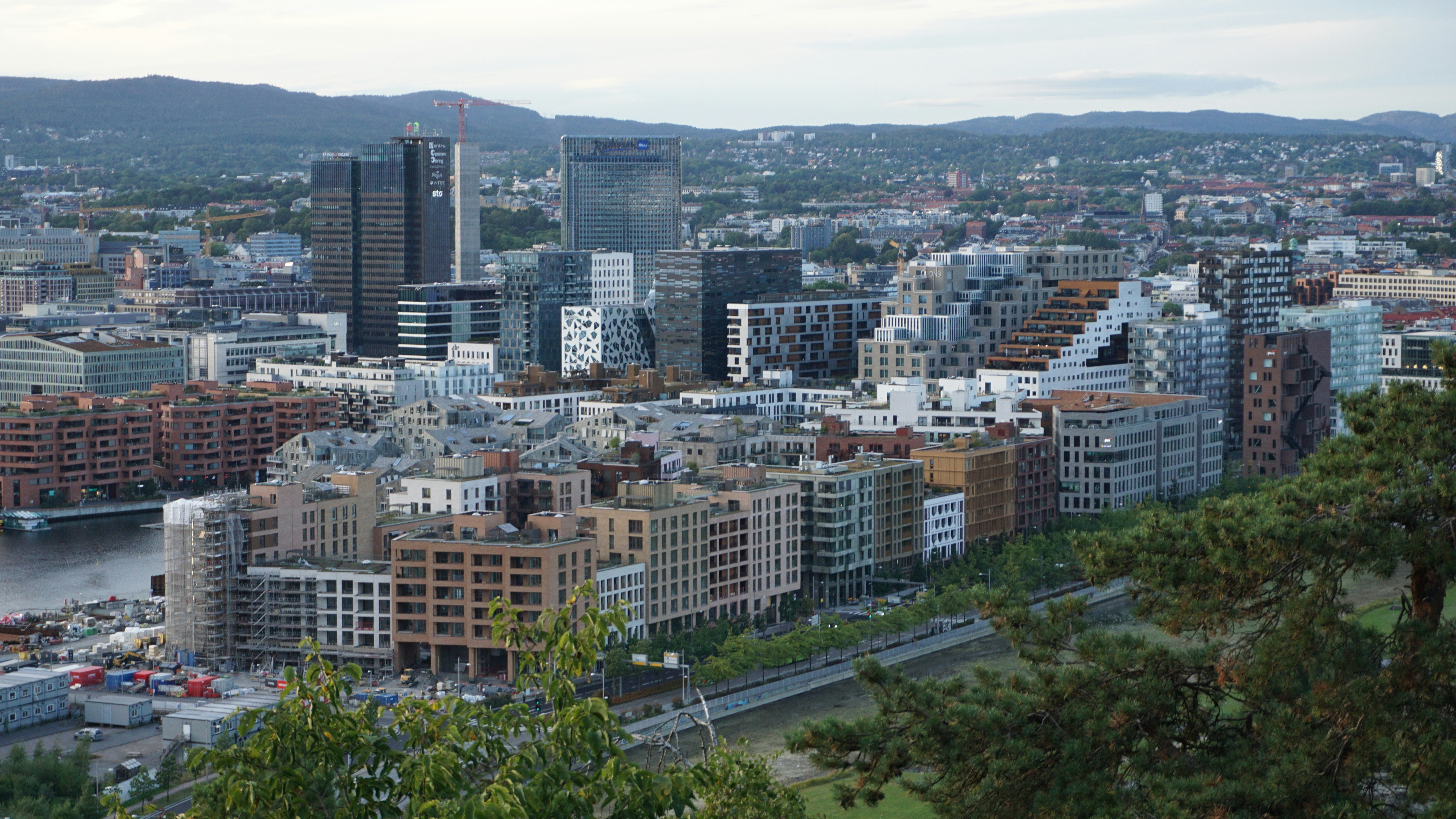 Urban Horizon: Riverfront Apartments and Modern Cityscape