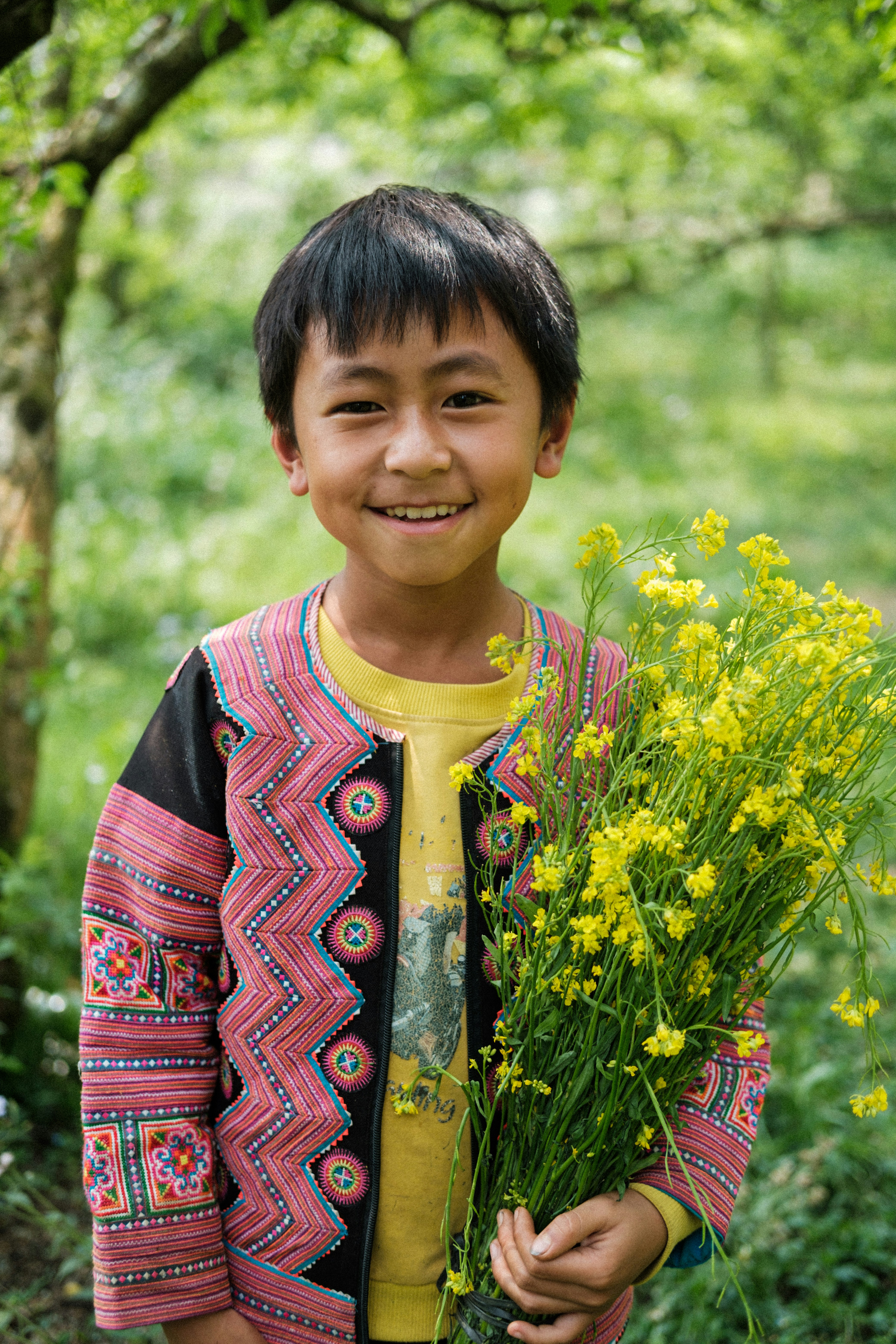 Joyful Portrait Amid Yellow Blooms