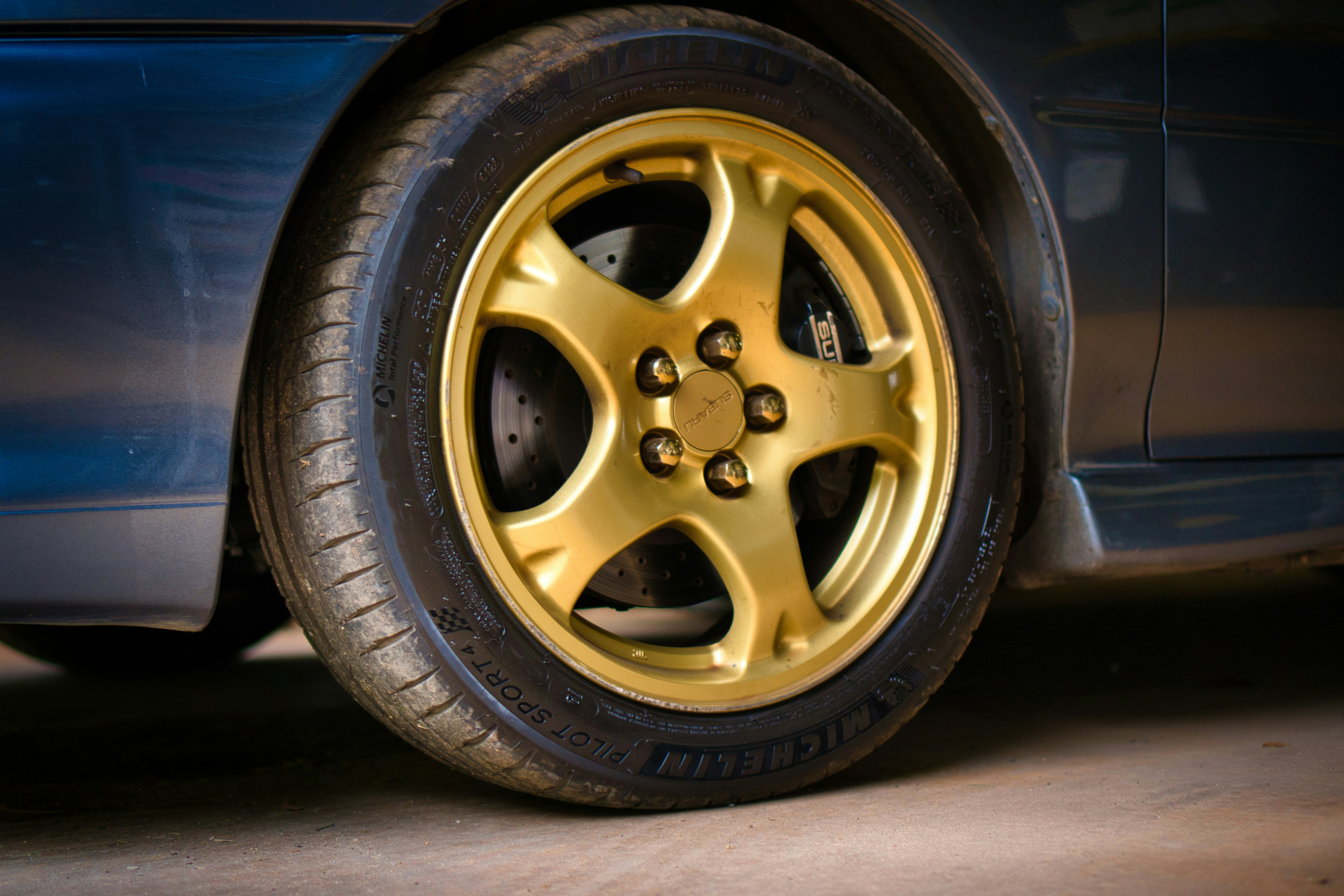 Golden Wheel: A Close Look at a Sporty Rim and Tire