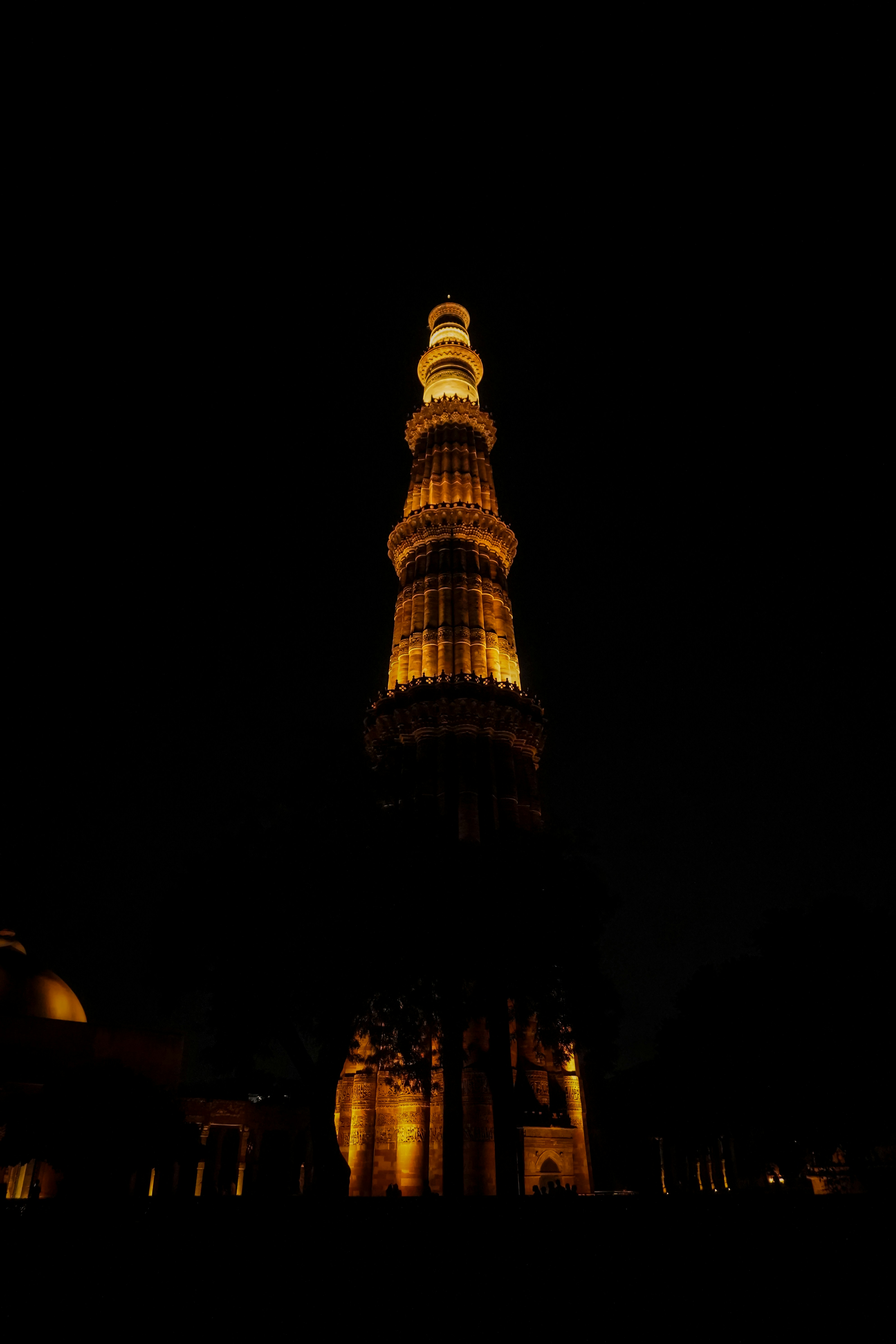 Golden Spire Ascending: Night Portrait of a Monumental Tower