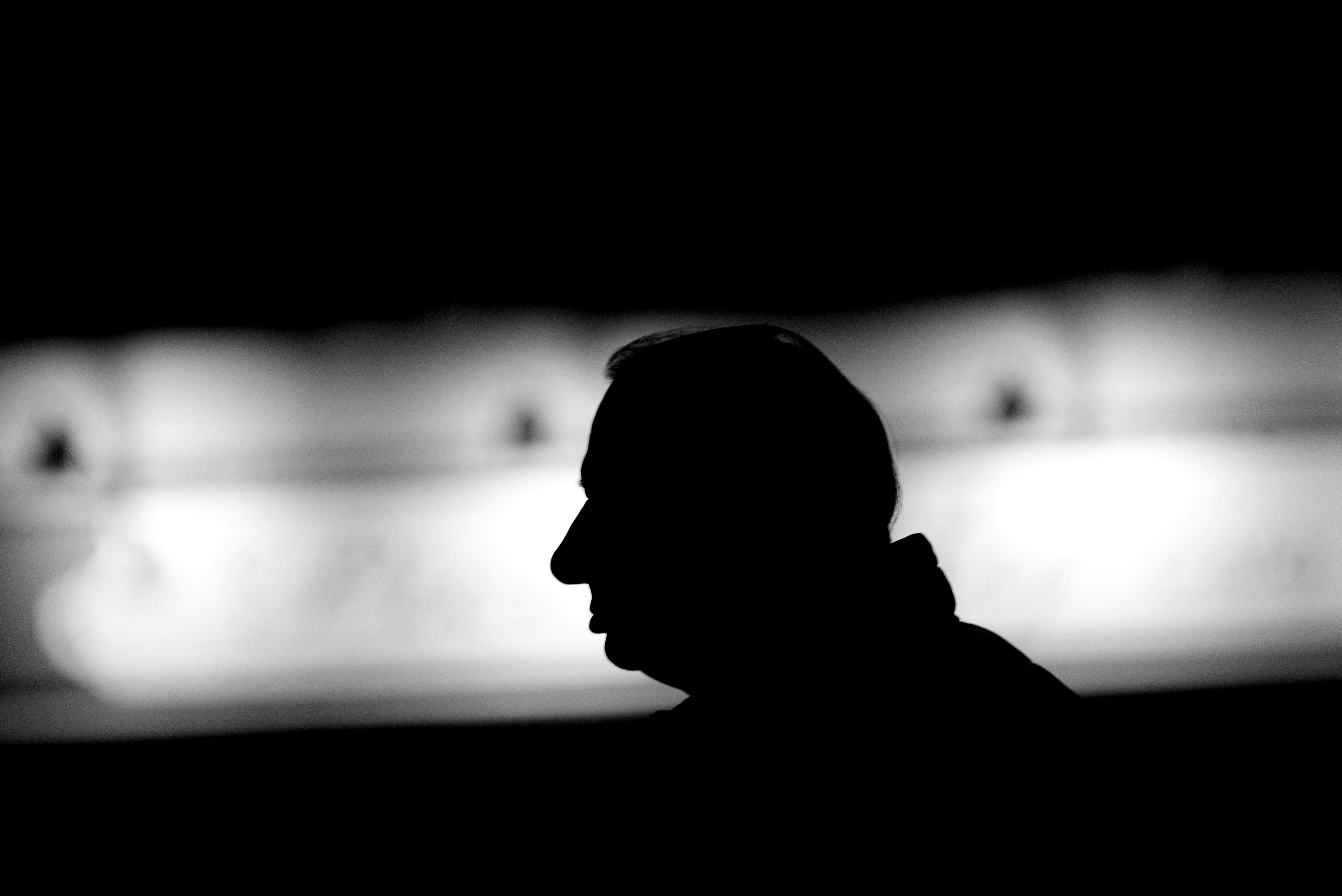 Silhouette in Motion: A Quiet Profile Against Neon Blur