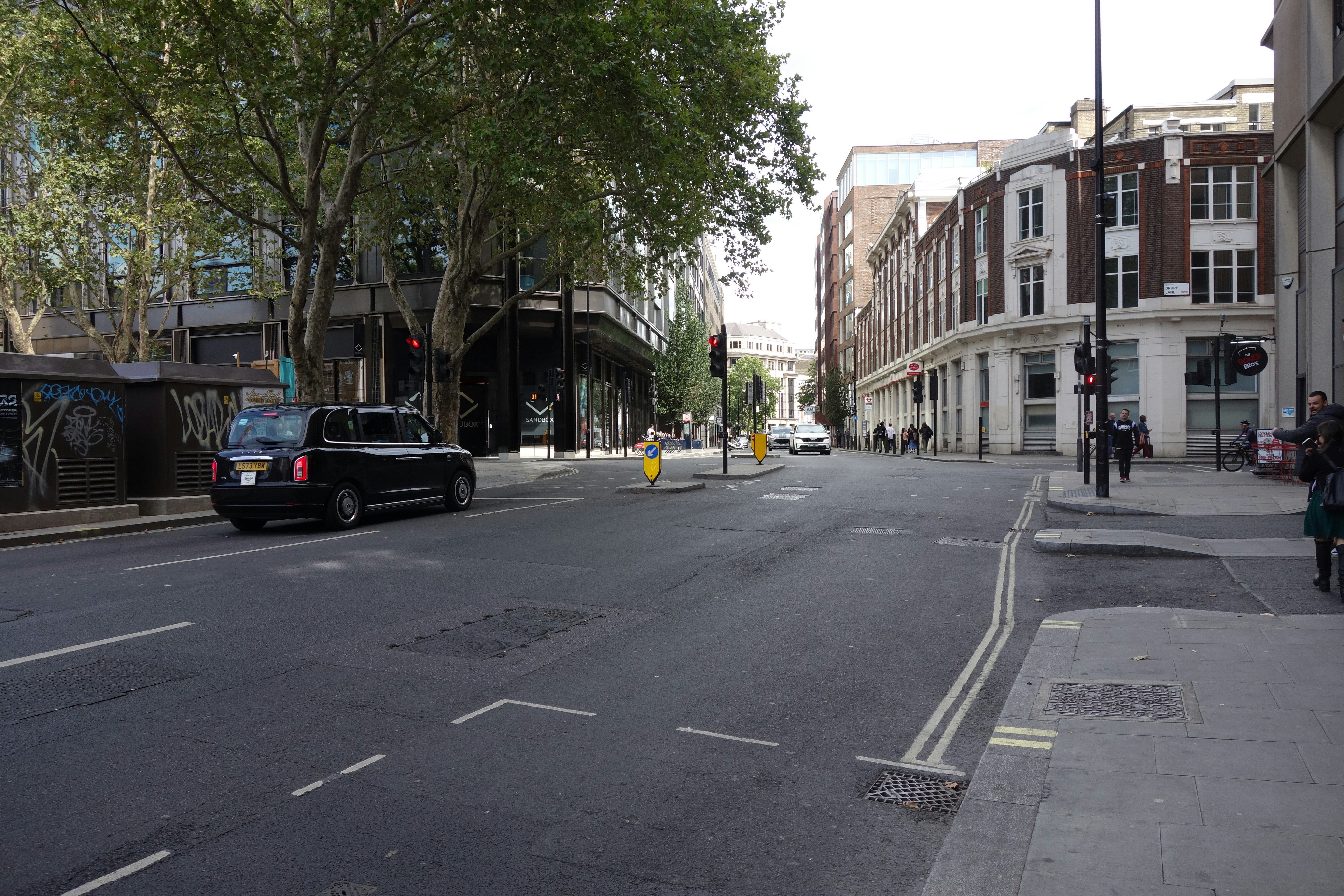 Urban Street Corridor: Quiet City Boulevard Leading to Distant Vanishing Point